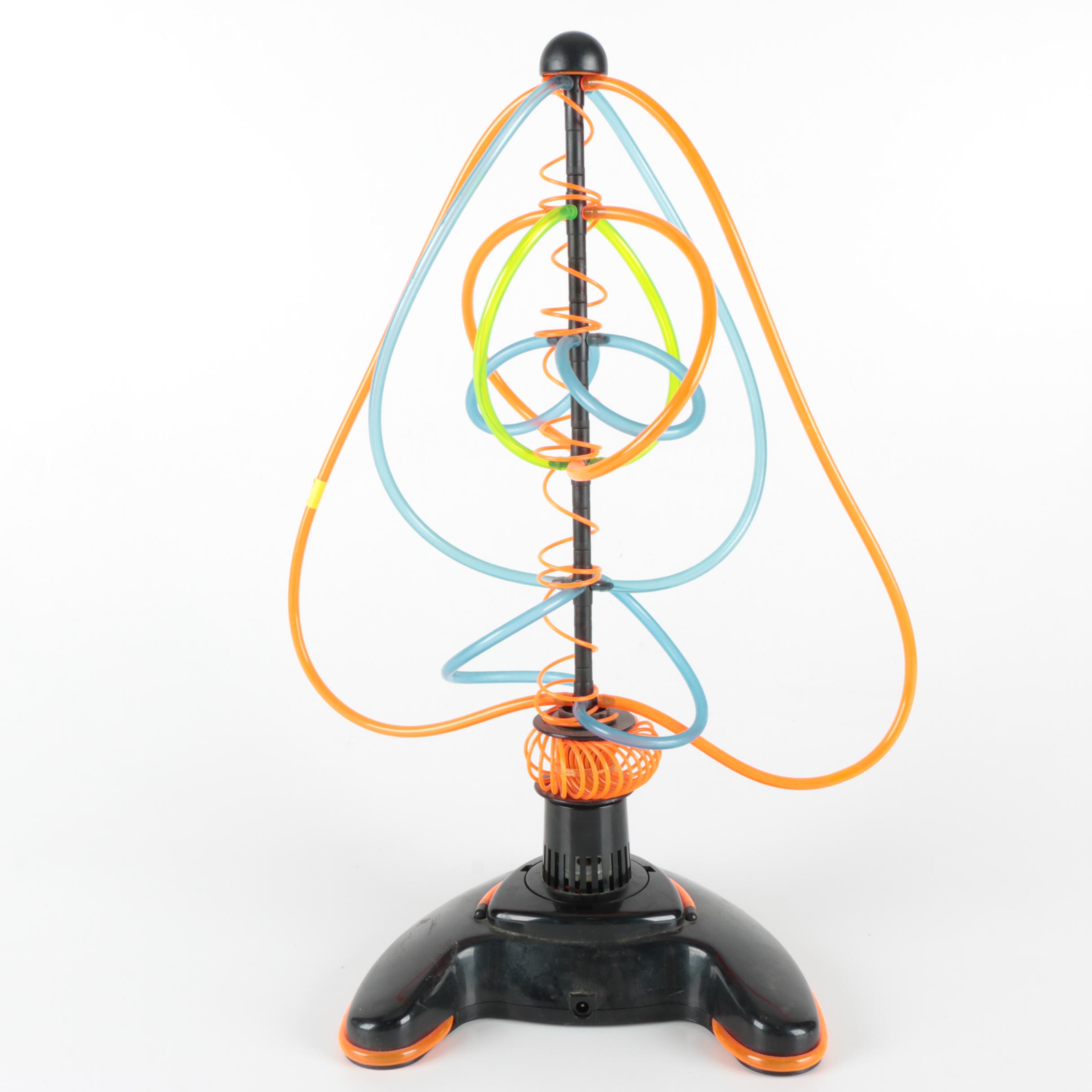 Planet Time Blacklight Reactive Spintrix Toy | EBTH