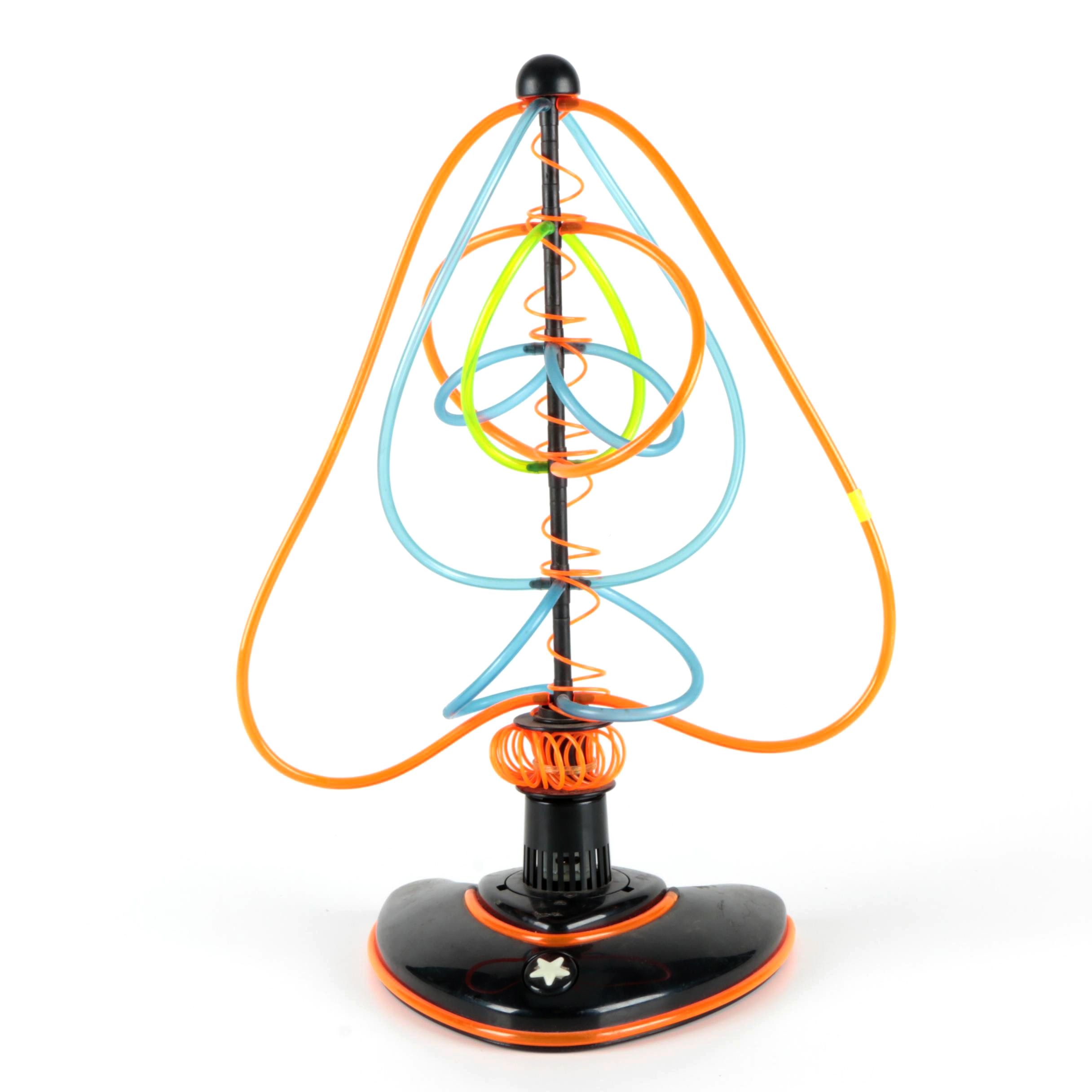 Planet Time Blacklight Reactive Spintrix Toy | EBTH
