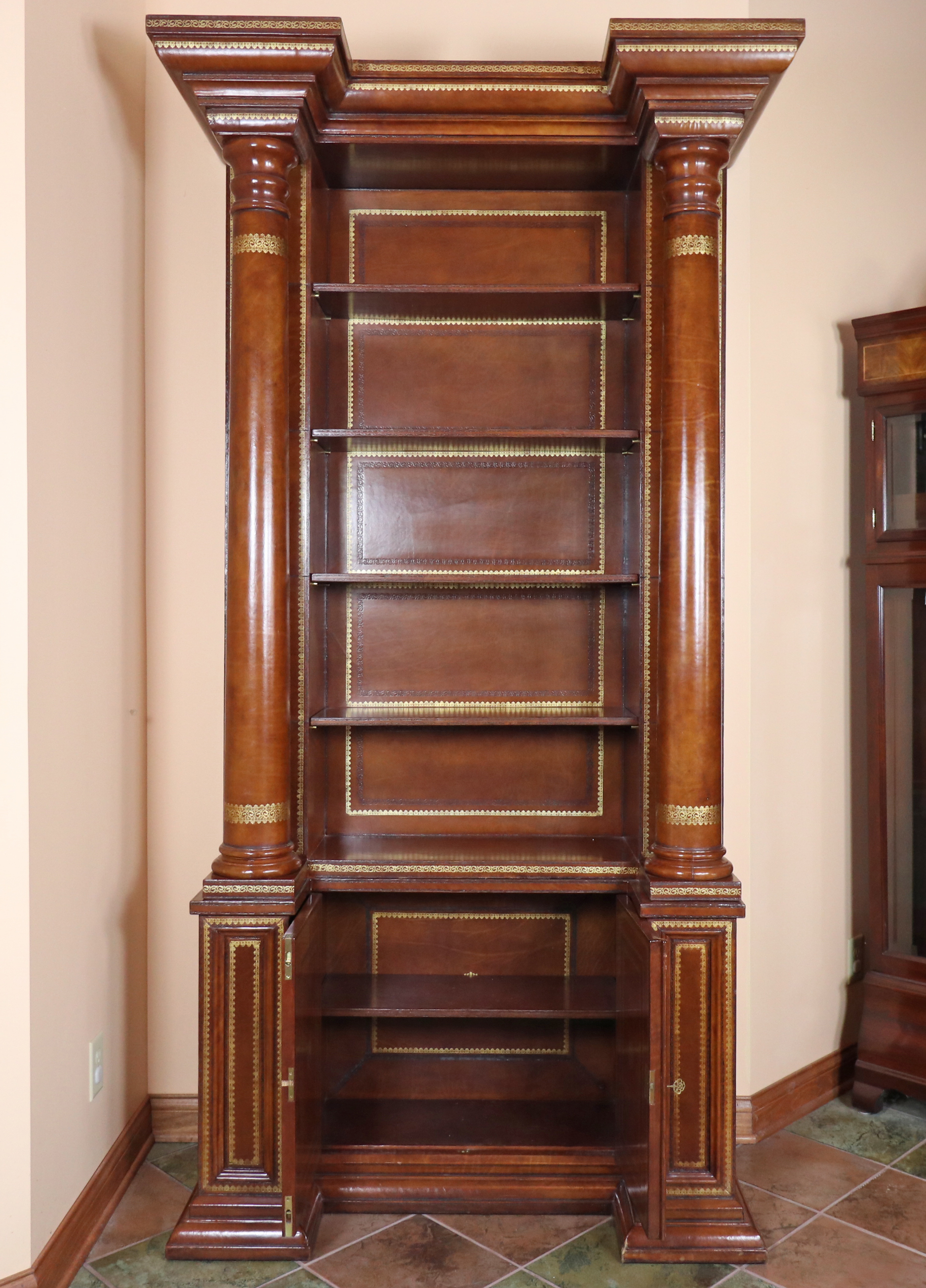 Maitland-Smith Empire Style Gilt-Tooled Leather-Clad Bookcase | EBTH