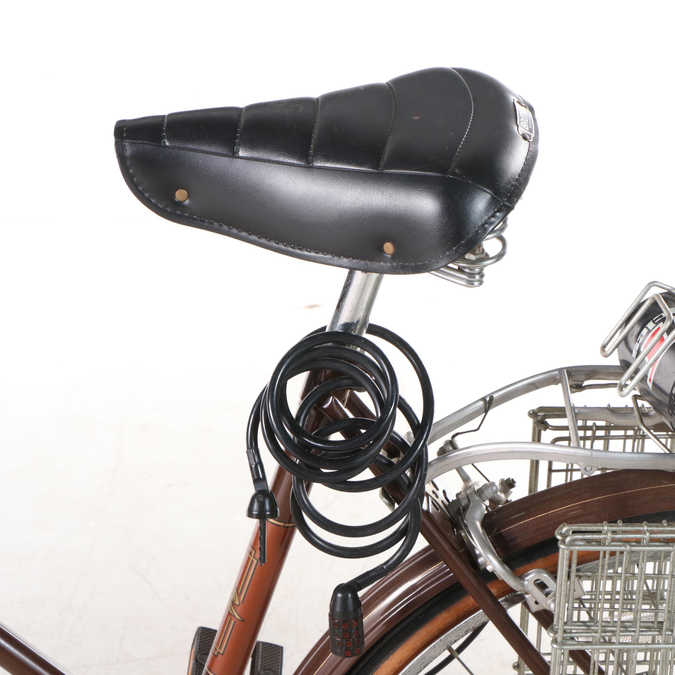 The Raleigh Cruiser Bicycle with Rack, Custom Seat, Vintage | EBTH