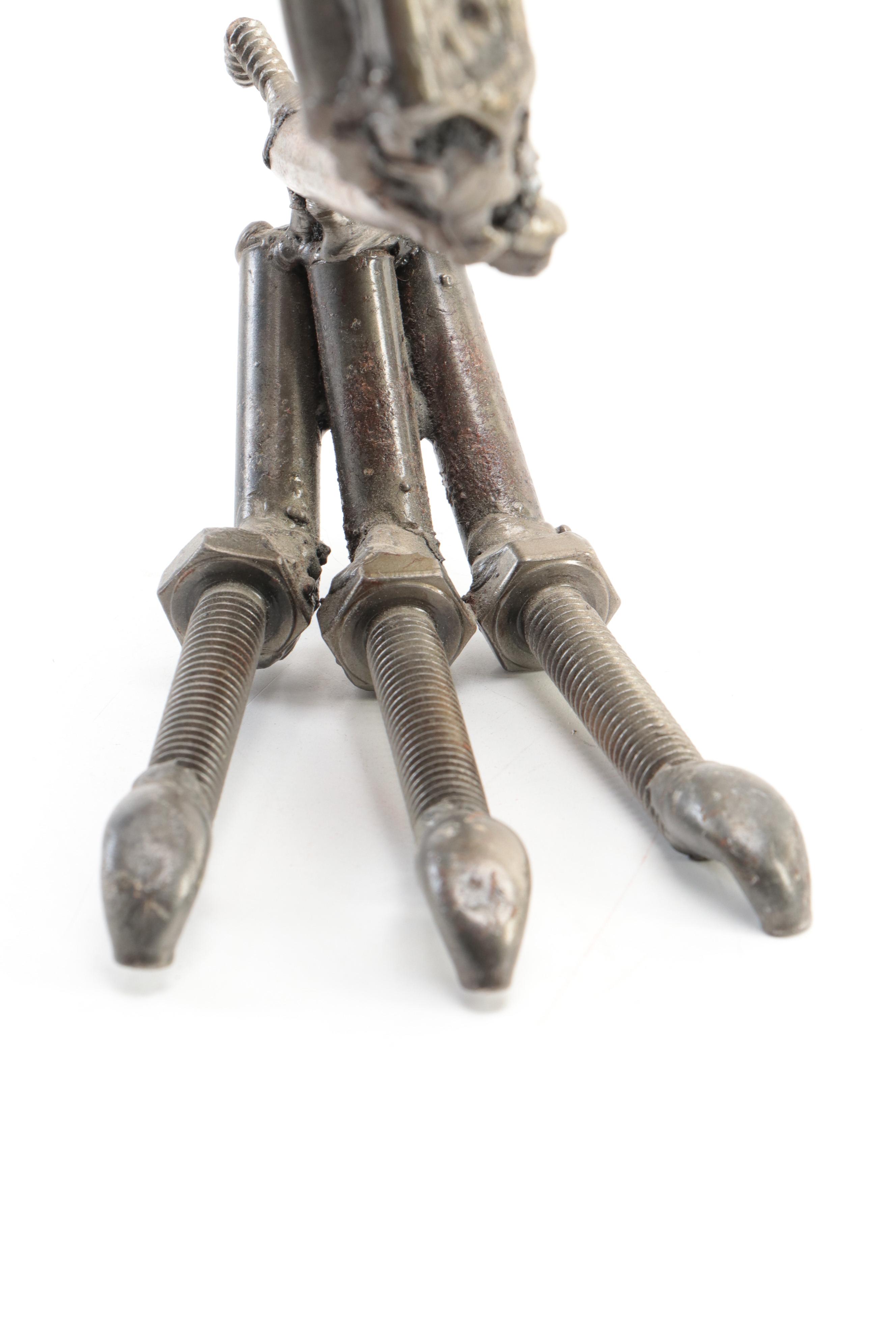 Metal Park Scrap Metal Sculpture of Predatory Dinosaur Skeleton | EBTH