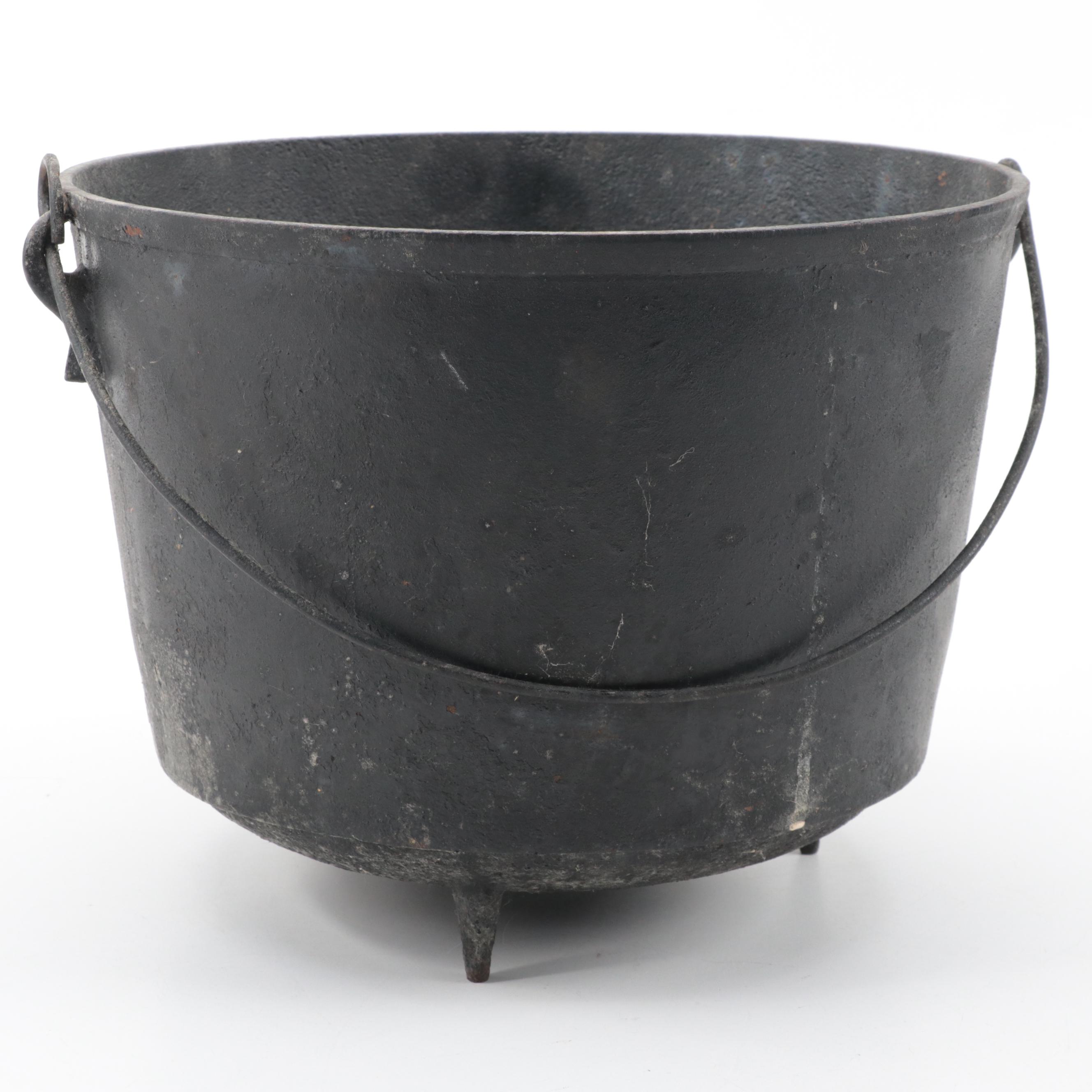 Cast Iron Three-Foot Cauldron with Cobblers Shoe Forms and Stand | EBTH