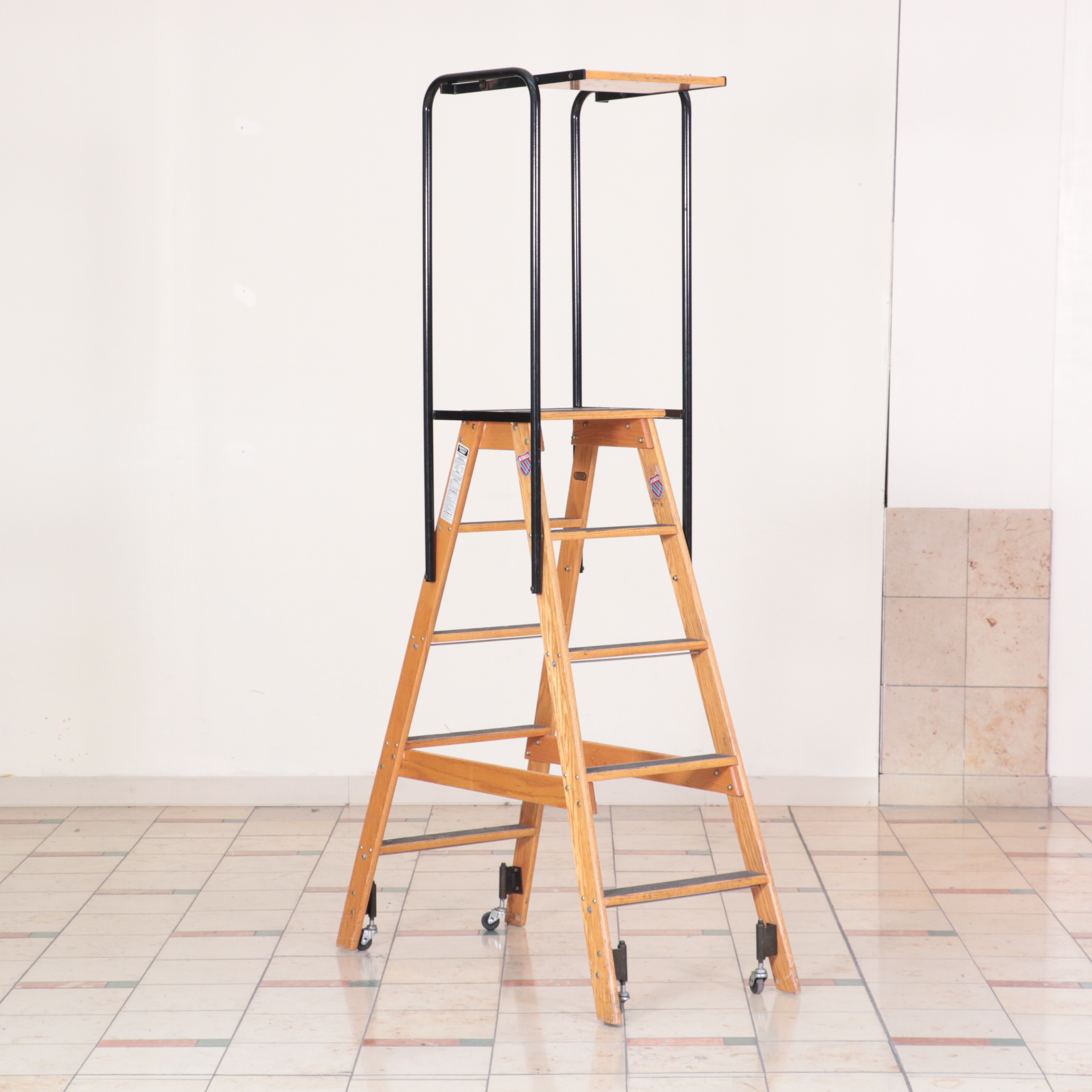Pair of Putnam Finished Wood and Metal Rolling Ladders | EBTH