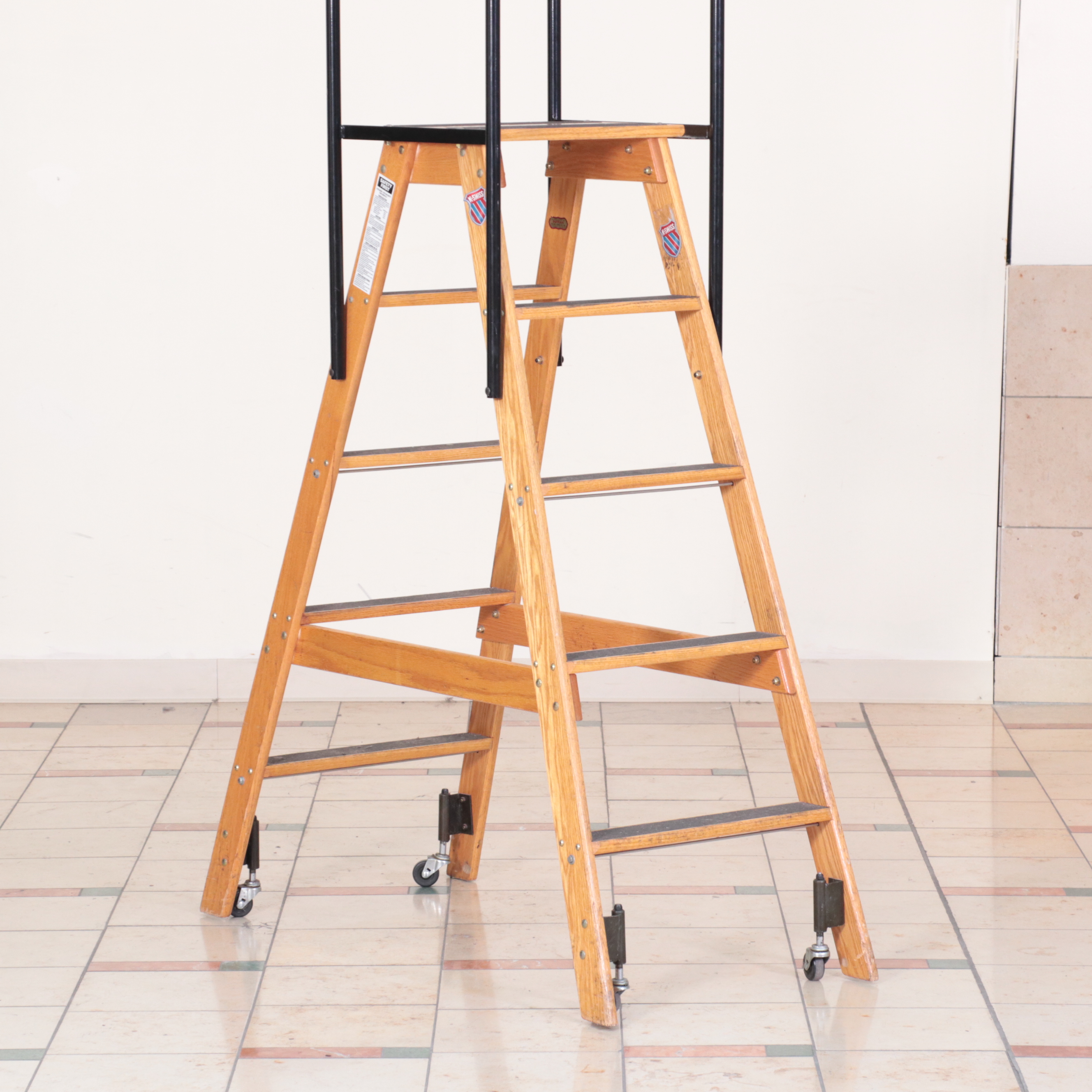 Pair of Putnam Finished Wood and Metal Rolling Ladders | EBTH