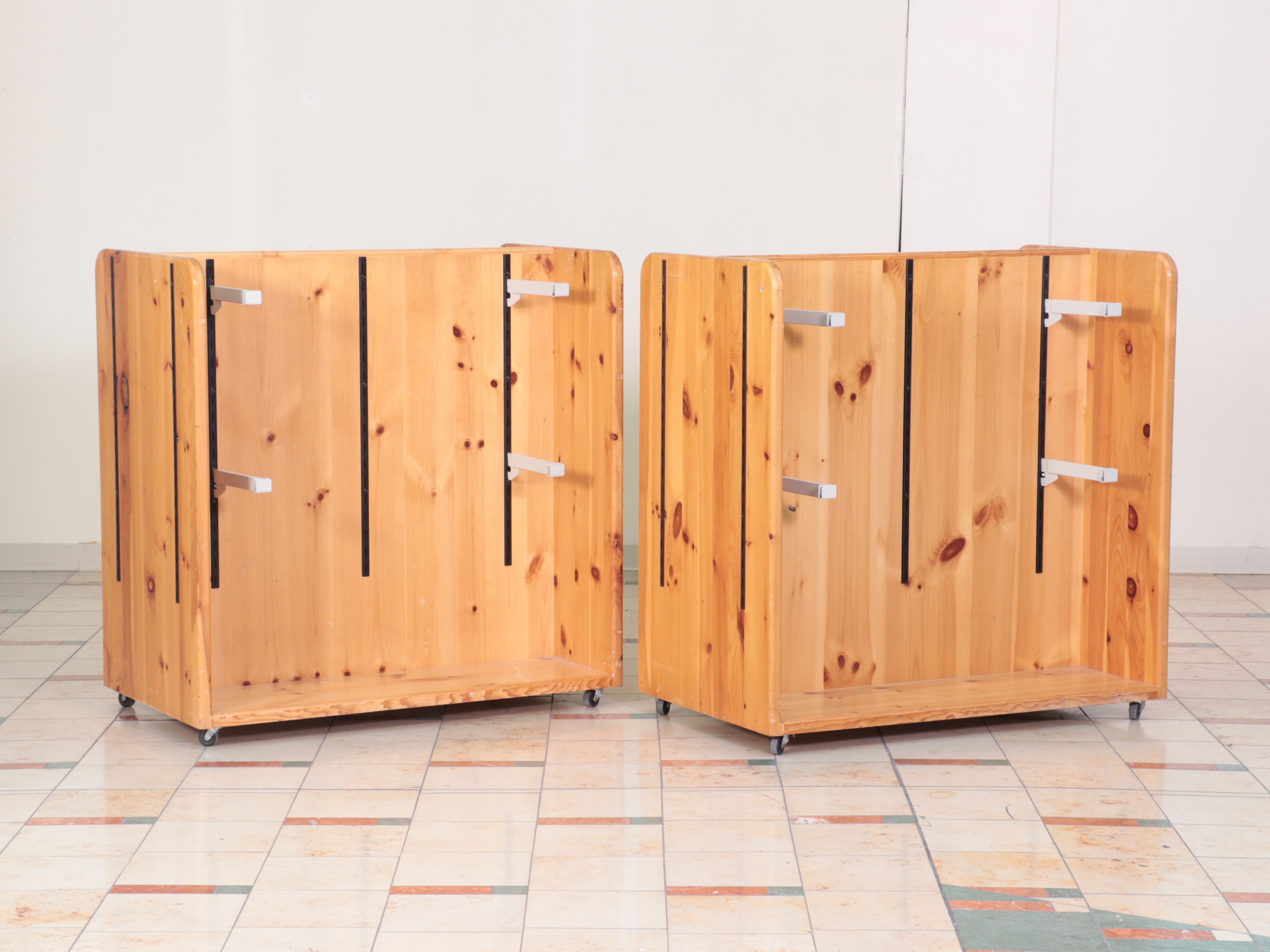 Pair of Paneled Pine Rolling Clothing Display Racks | EBTH