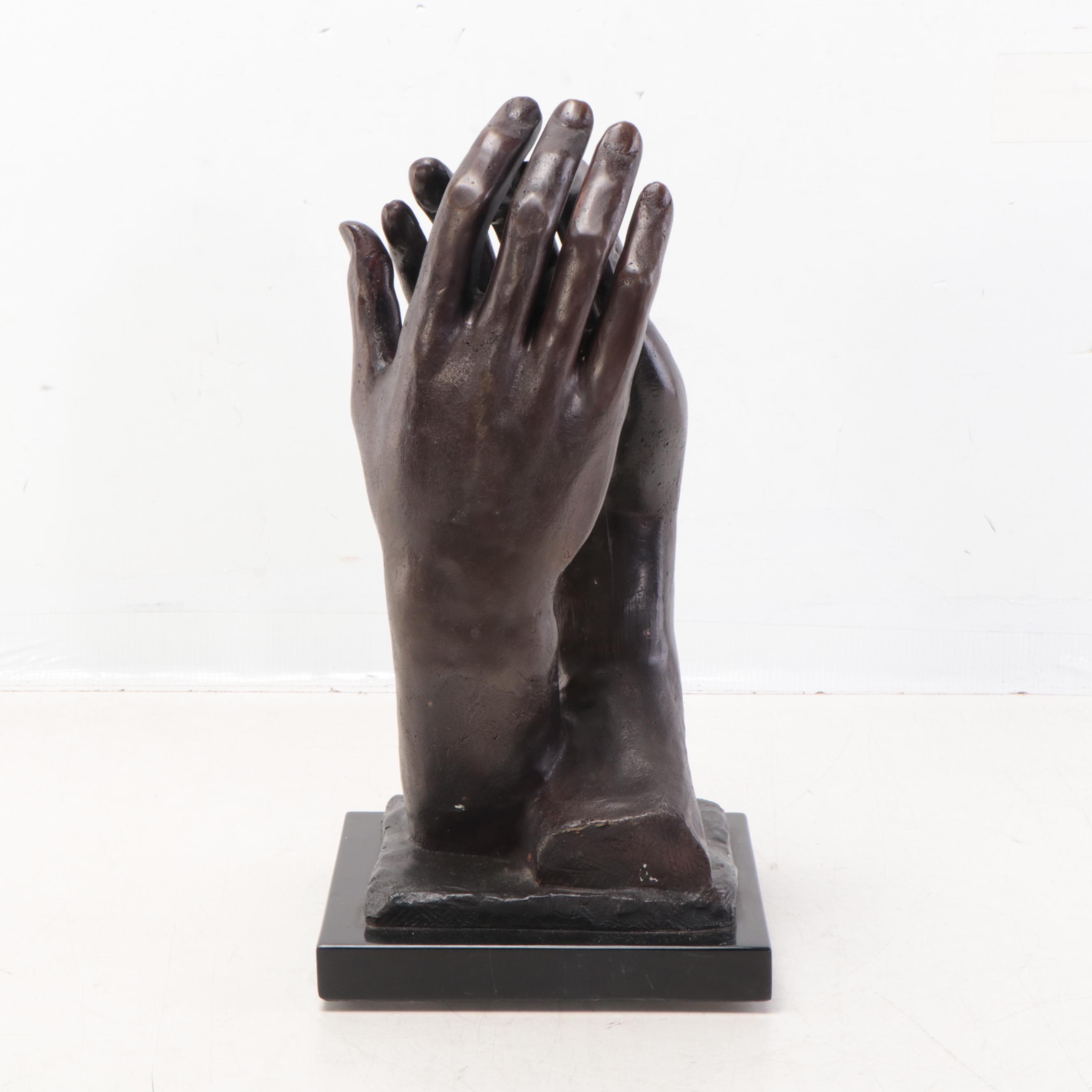 Metal Sculpture of Hands Embracing | EBTH