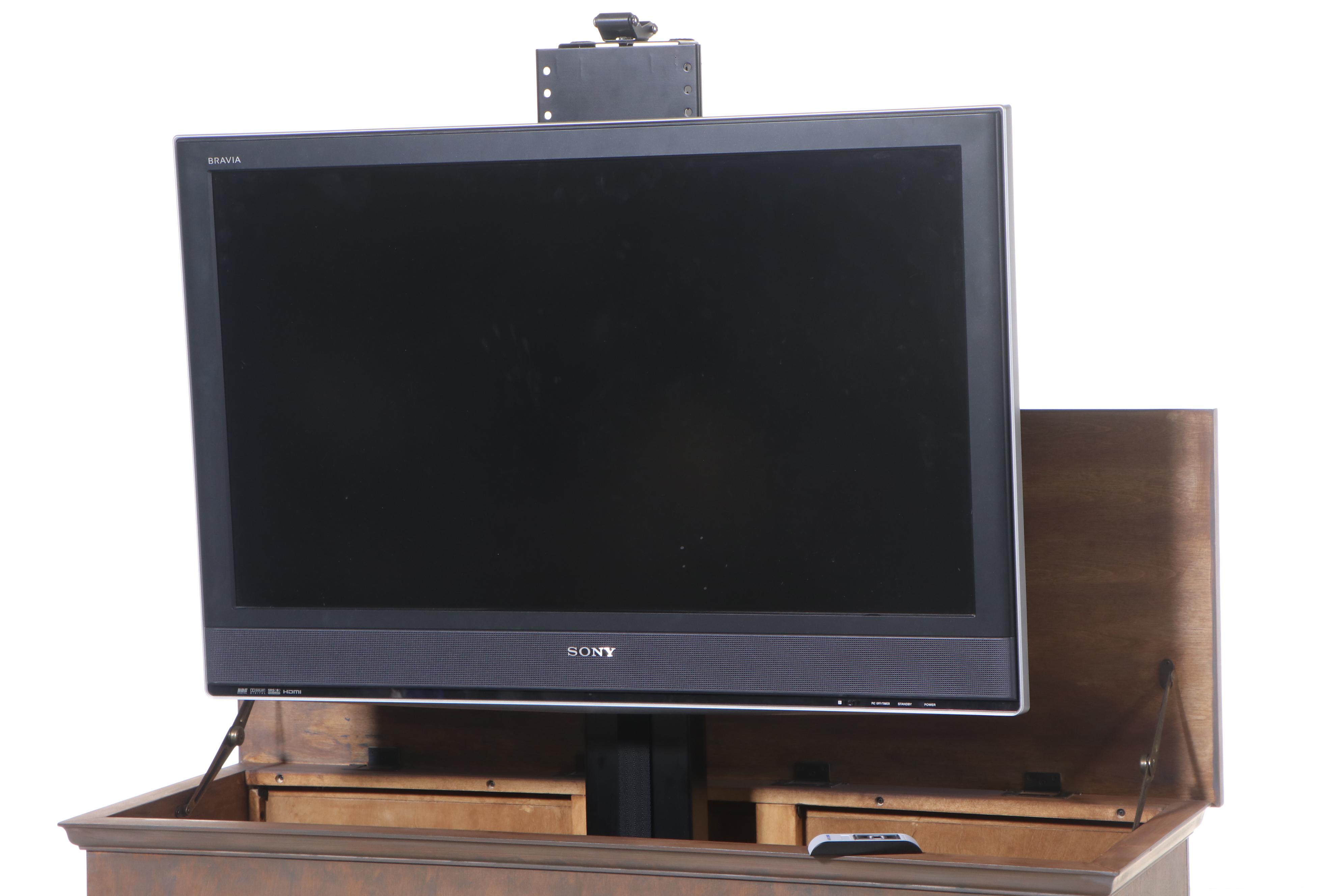 Sony Bravia 40" Flat Screen Television with Remote Lift Cabinet | EBTH