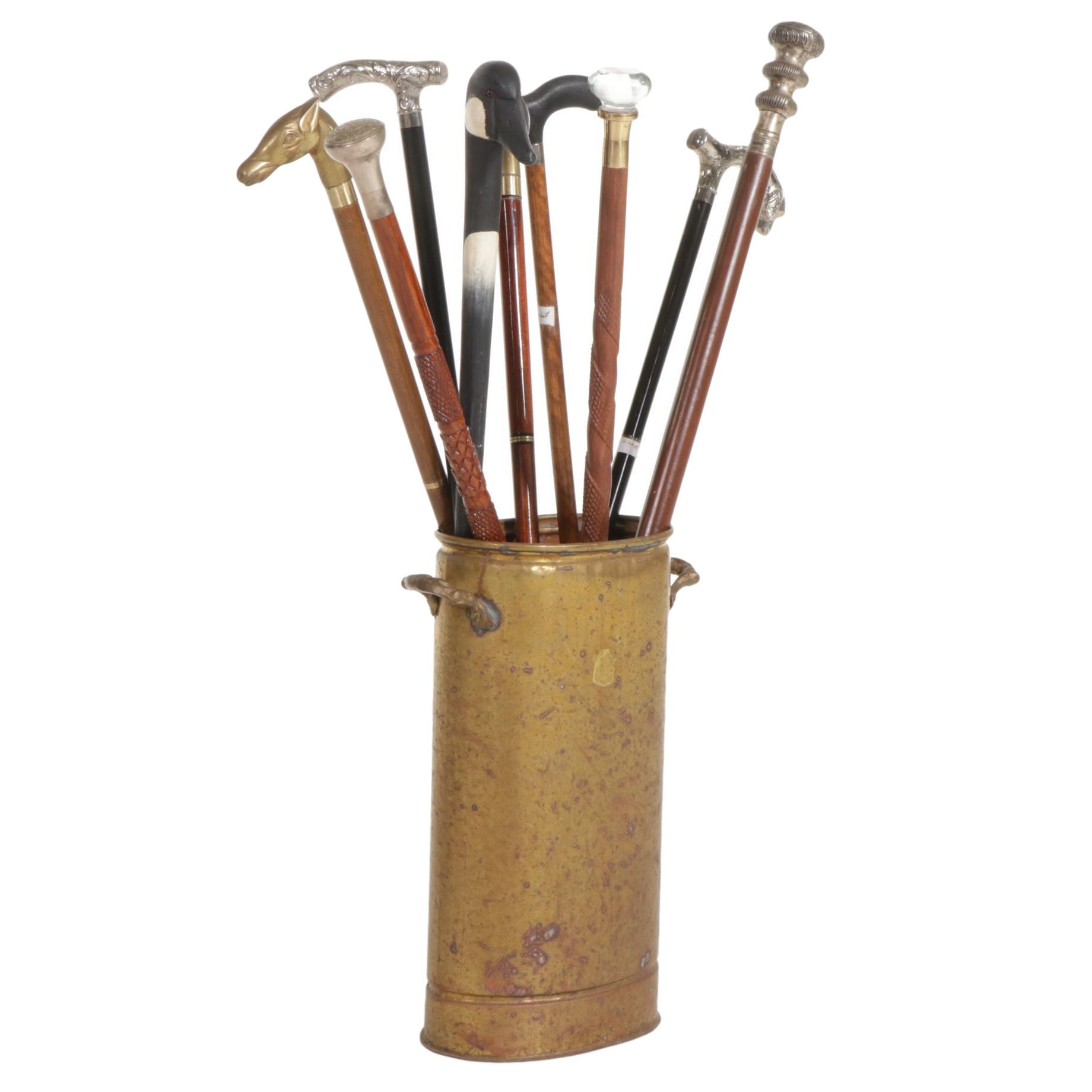 Nine Canes and a Brass Umbrella Stand, 20th Century | EBTH