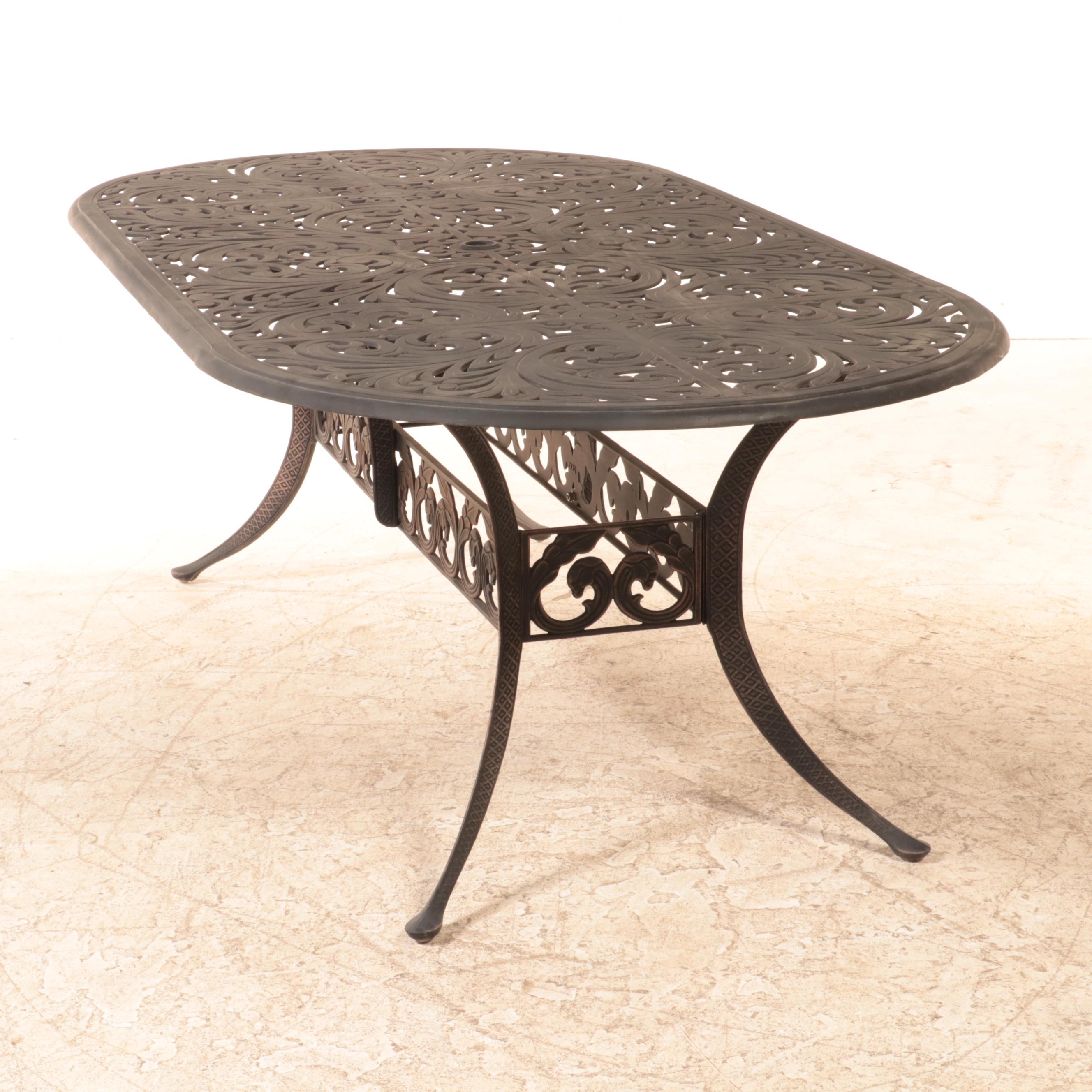 Eight-Piece Hanamint Patinated and Cast Aluminum Patio Dining Set | EBTH