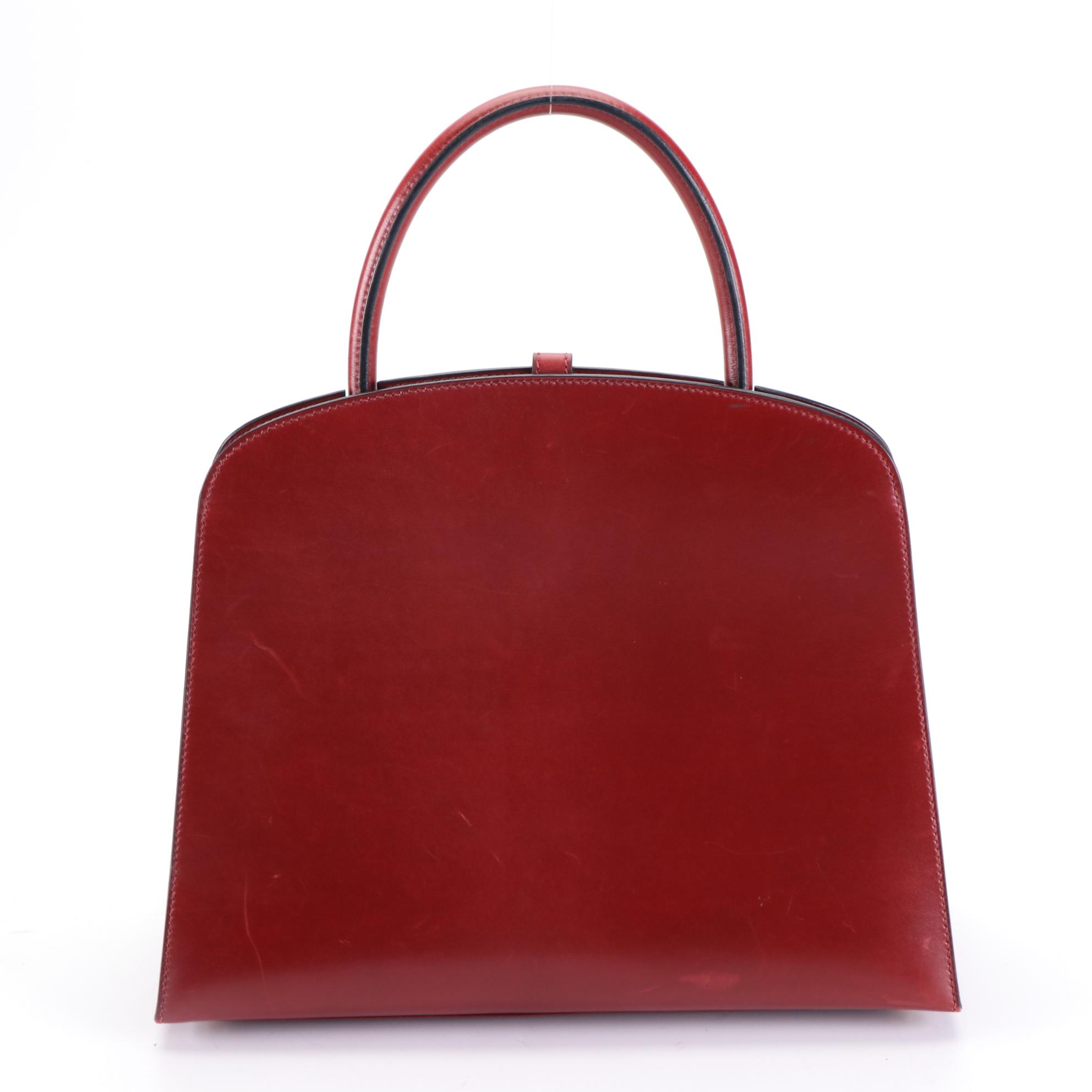 Hermès Dalvy Top Handle Bag in Rouge Box Calf Leather | EBTH