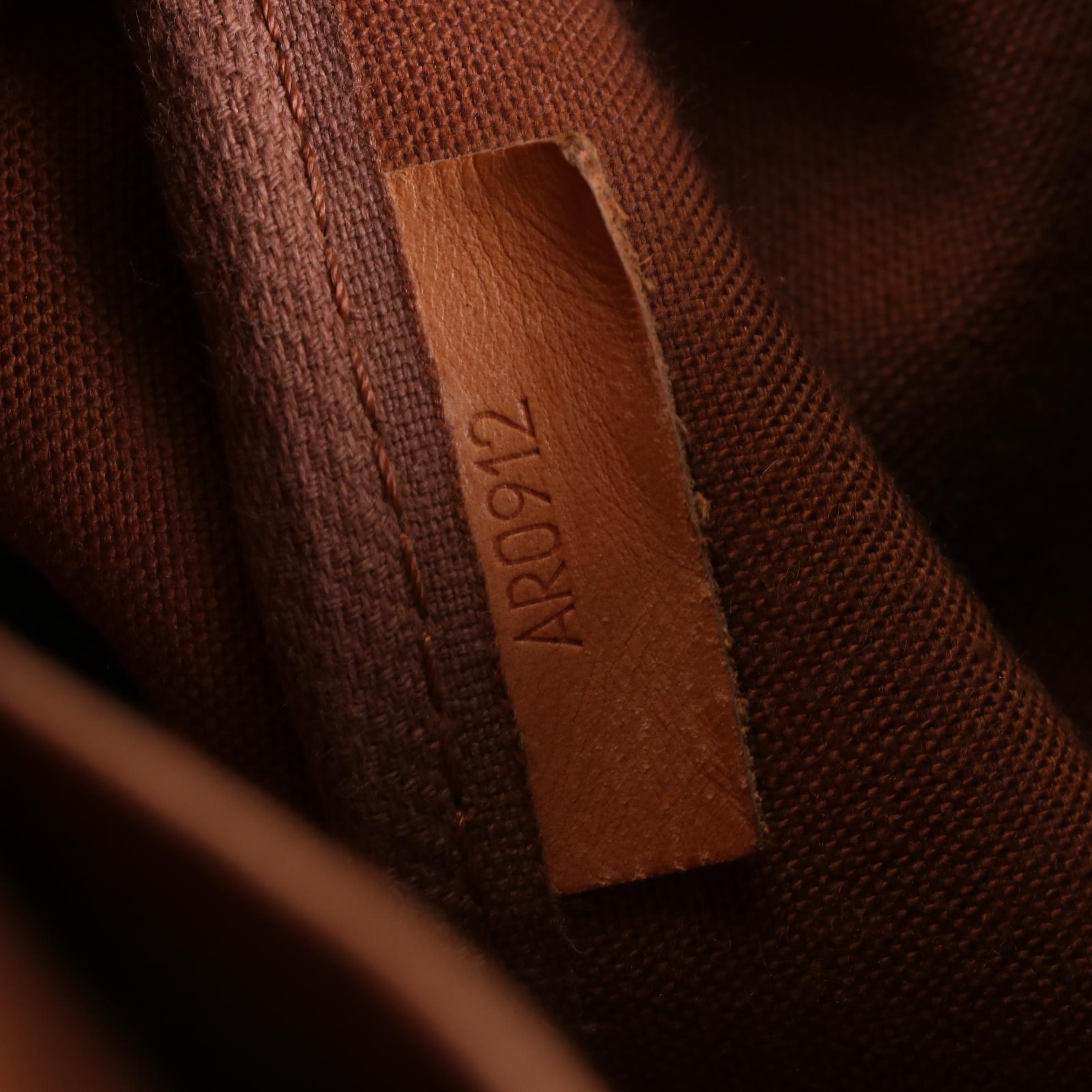 Louis Vuitton Saumur 35 in Monogram Canvas and Vachetta Leather | EBTH