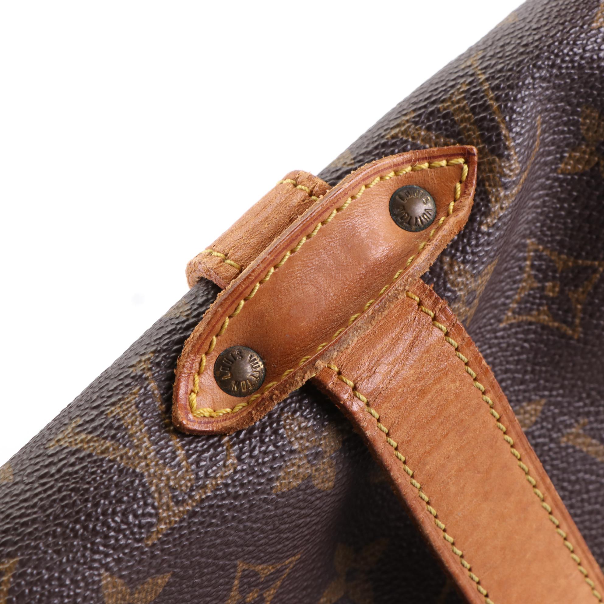 Louis Vuitton Saumur 35 in Monogram Canvas and Vachetta Leather | EBTH