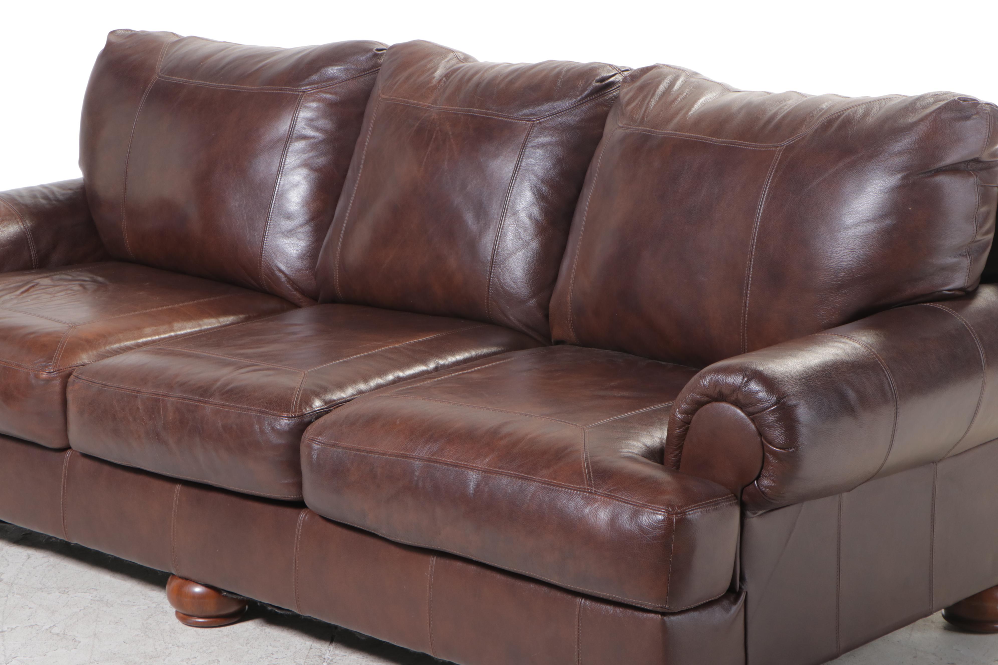 Ashley Furniture Brown Leather Roll-Arm Sofa | EBTH