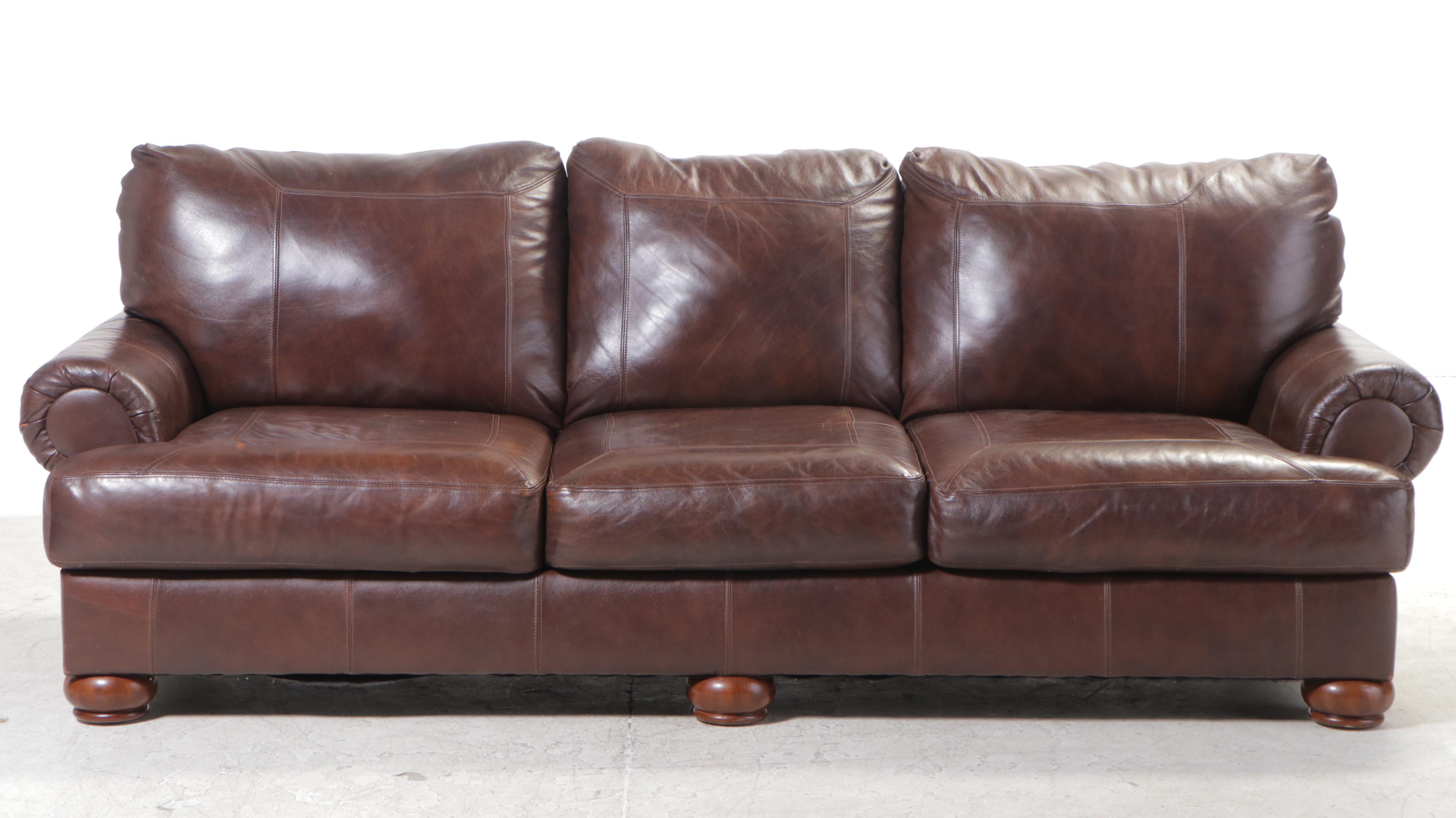 Ashley Furniture Brown Leather Roll-Arm Sofa | EBTH