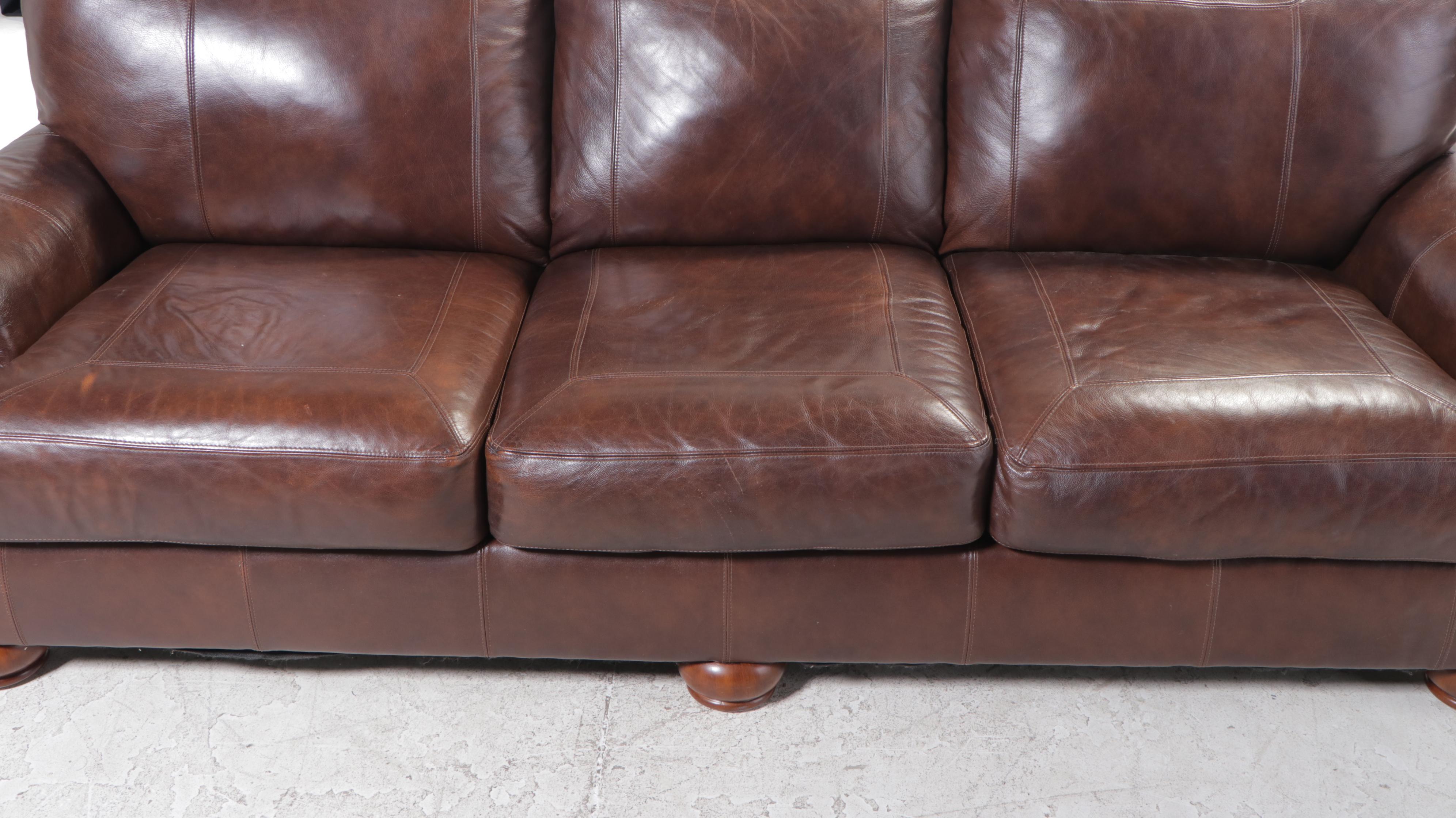 Ashley Furniture Brown Leather Roll-Arm Sofa | EBTH
