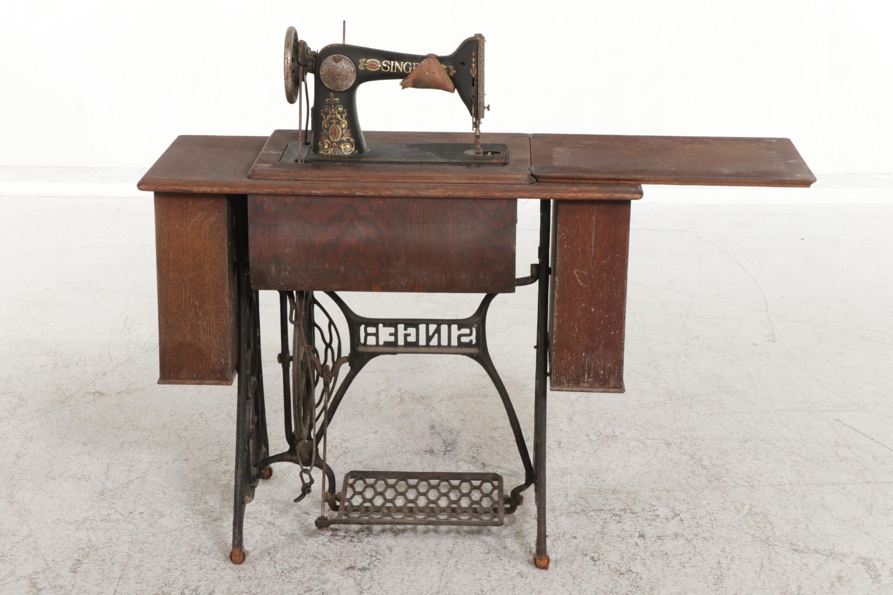 Singer Model 15 Treadle Sewing Machine in Oak and Iron Cabinet | EBTH