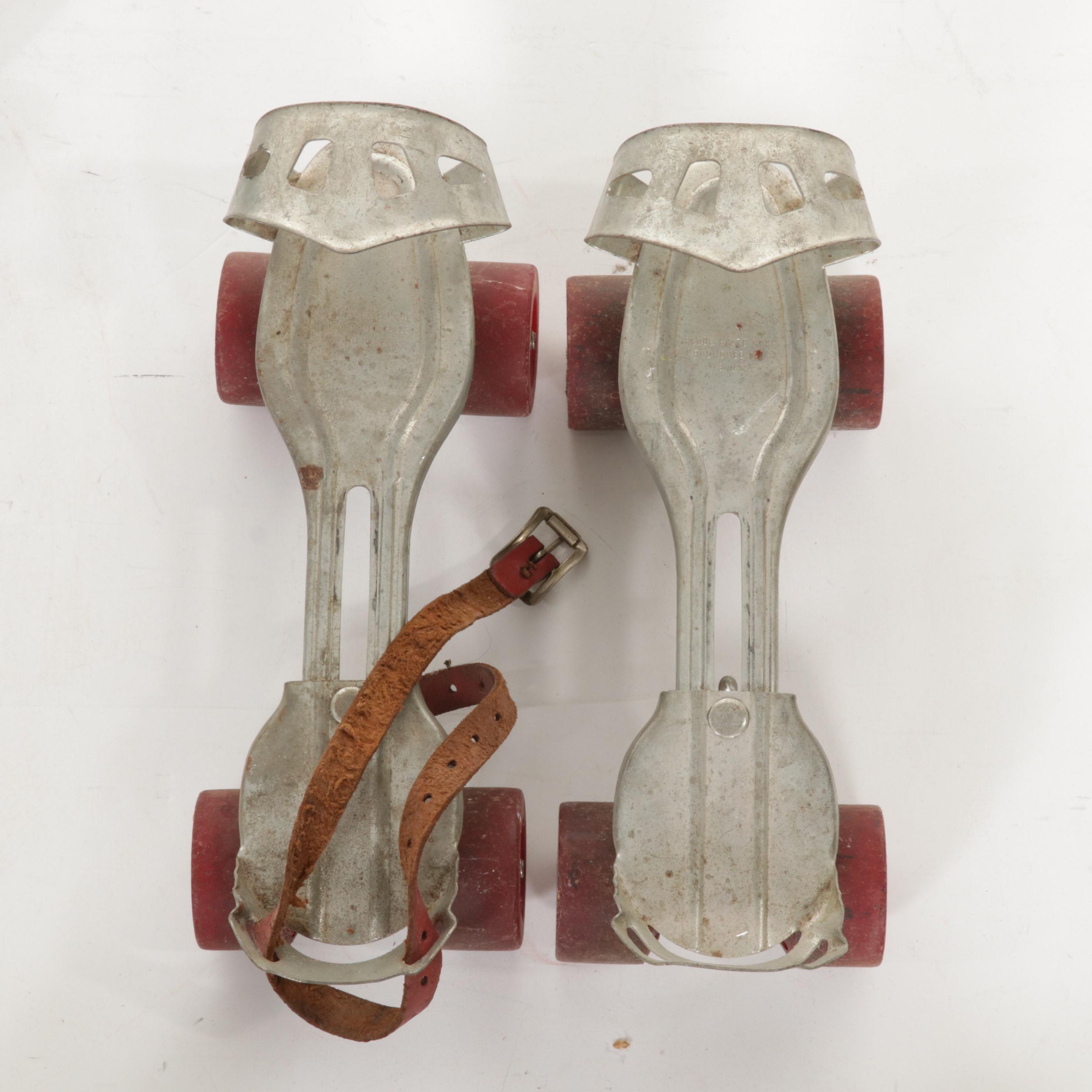 Champion Fastback Snow Sled and Clamp-on Roller Skates, Mid 20th ...