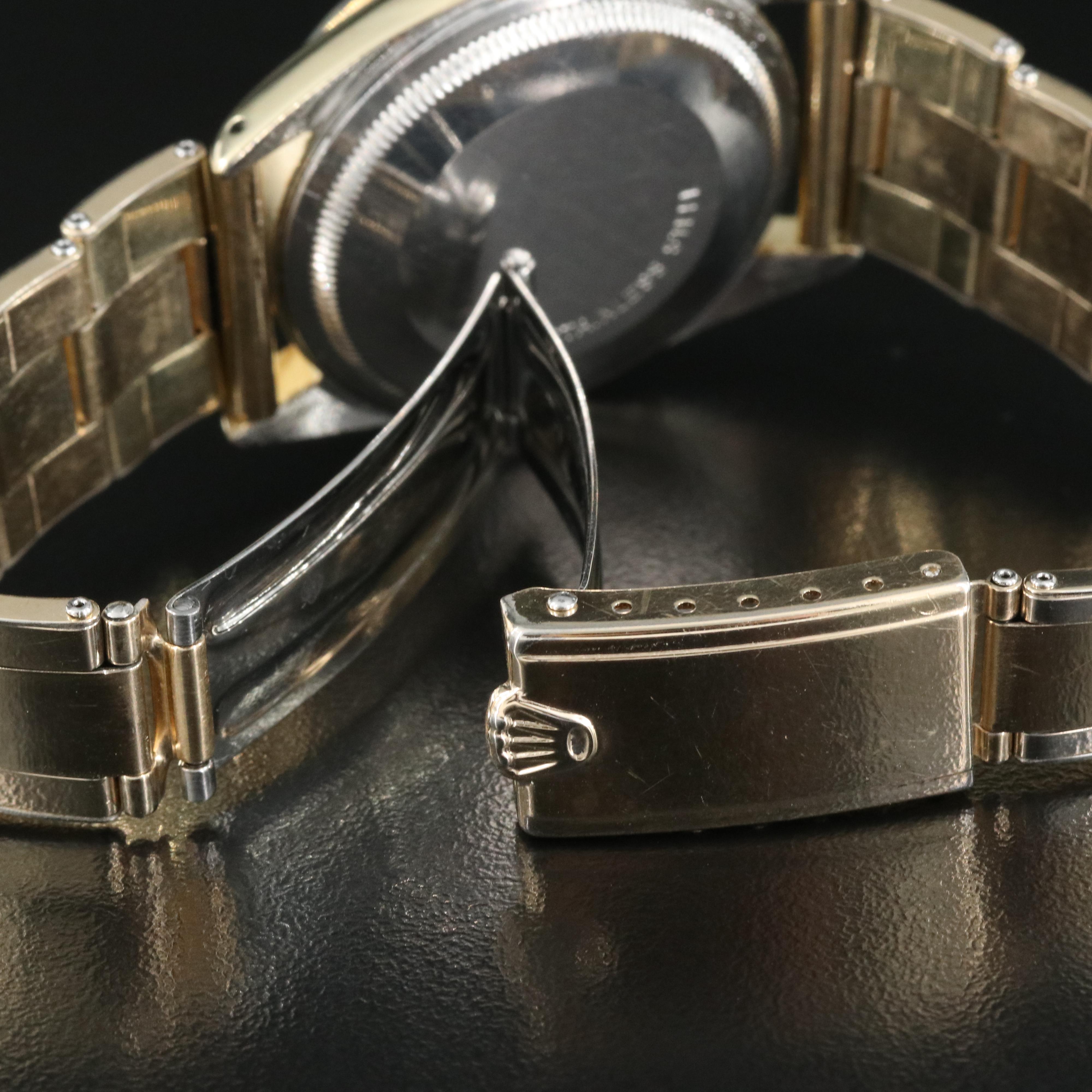 Rolex Oyster Perpetual Date Gold Shell Wristwatch | EBTH