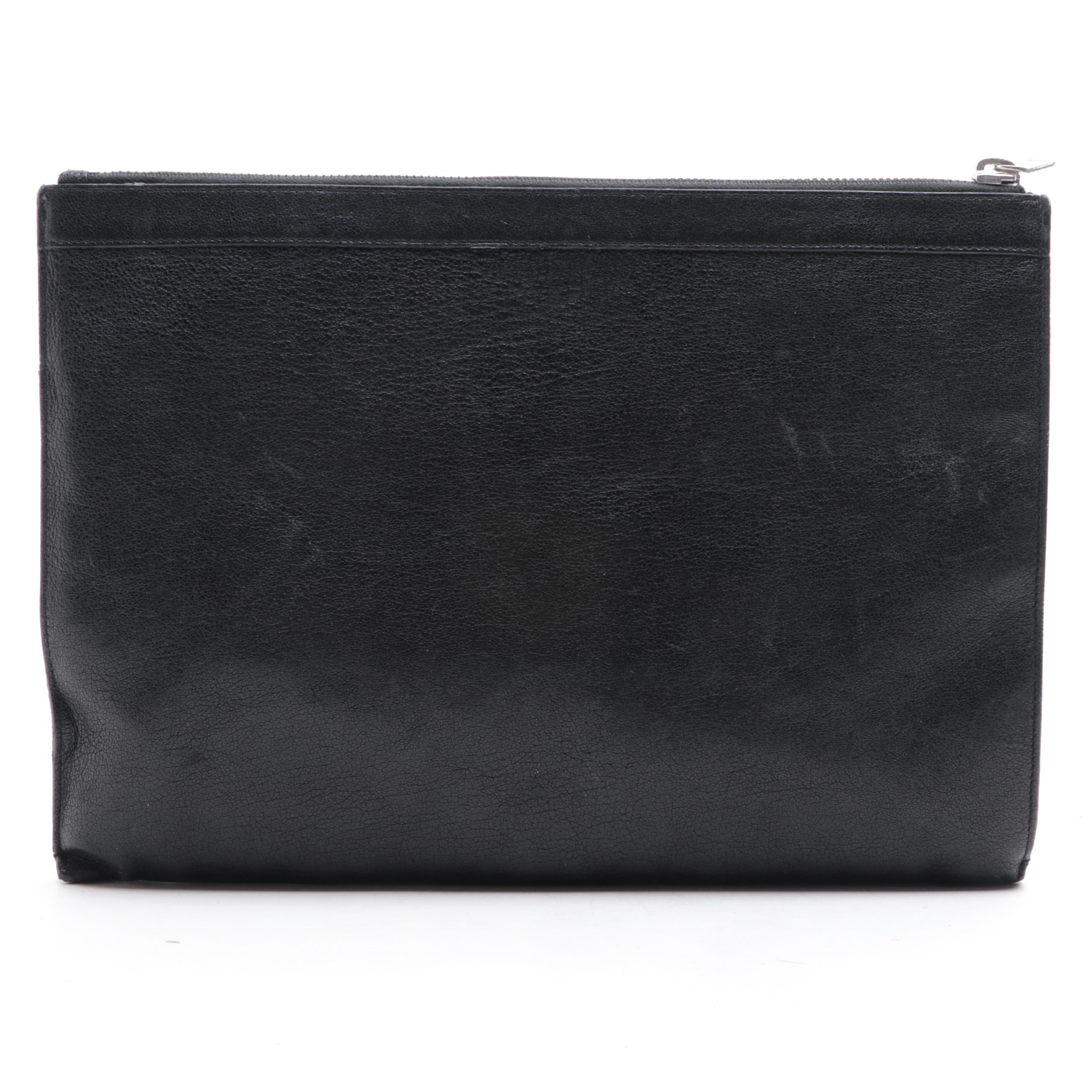 saint-laurent-clutch-in-studded-leather-ebth