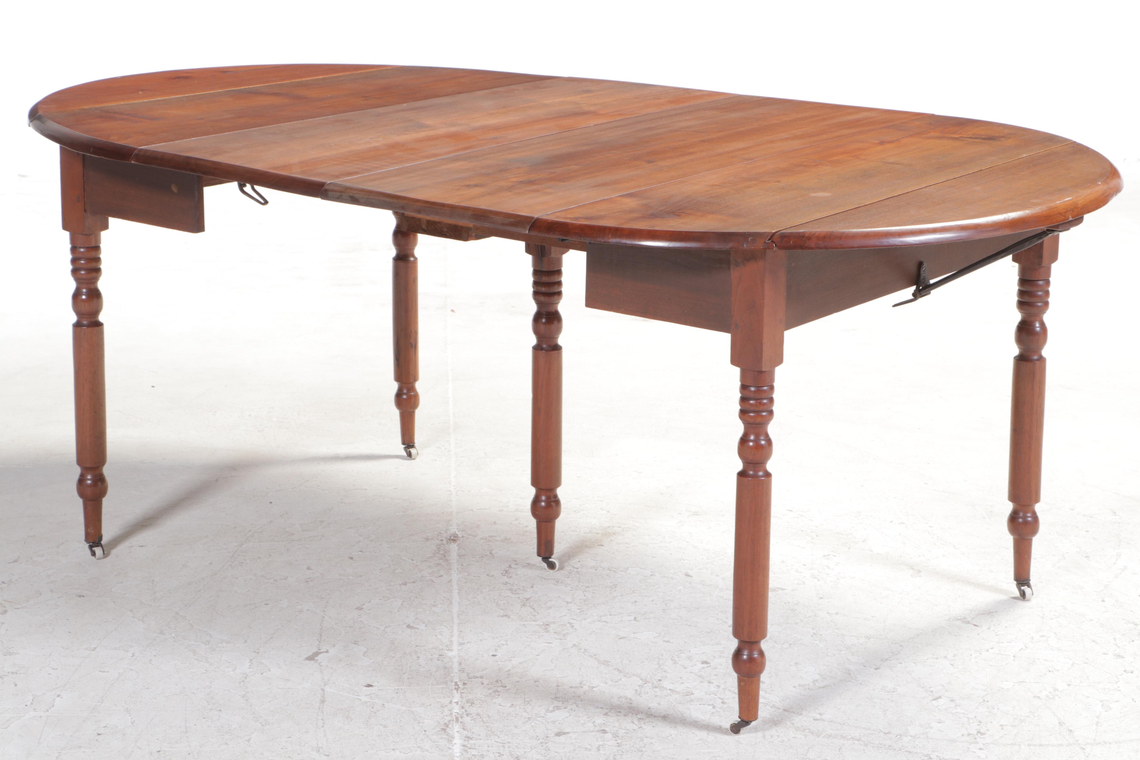 American Primitive Walnut Drop Leaf Extending Dining Table | EBTH