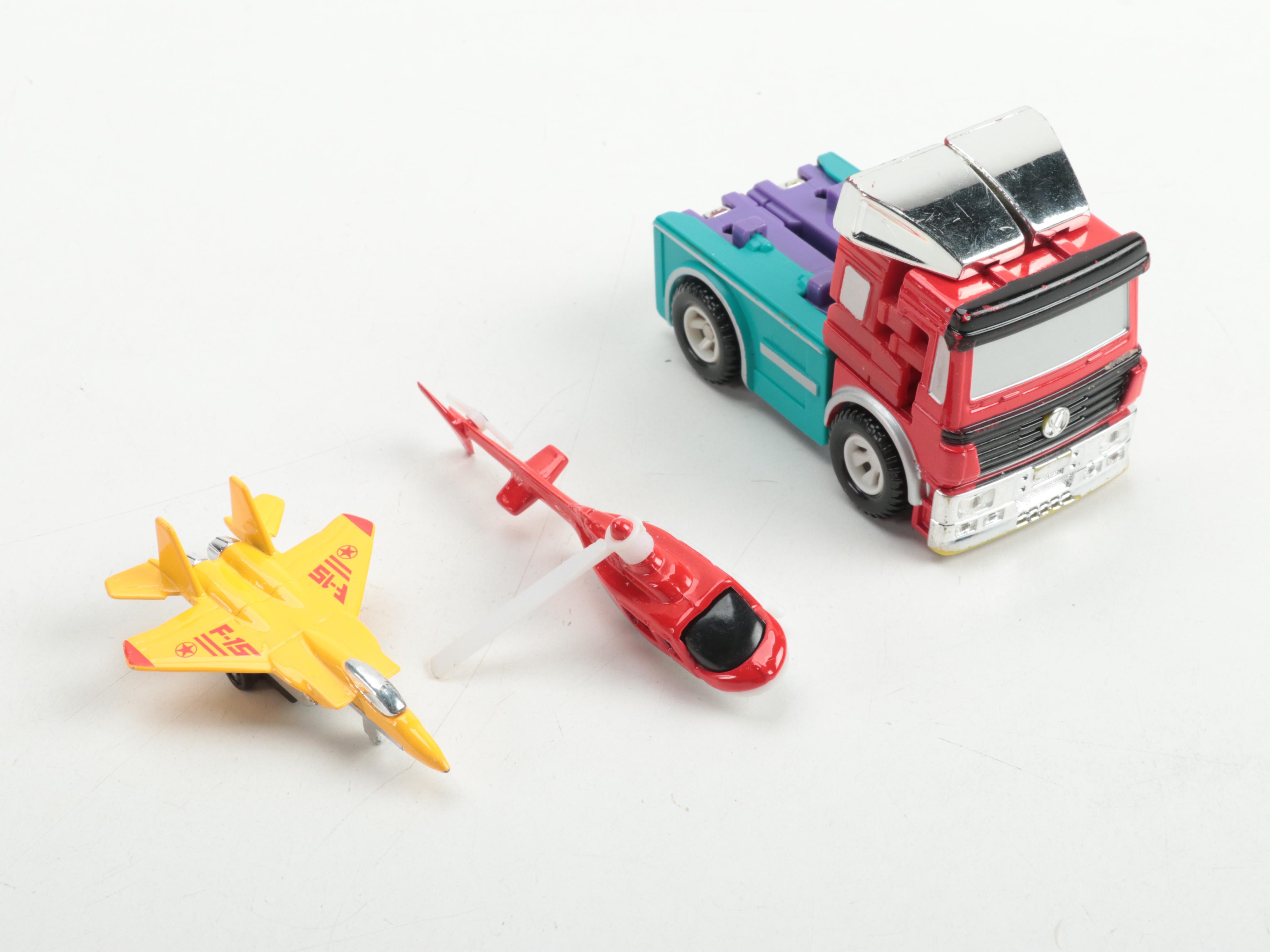 Transformer Action Figure with Other Cars and Race Track | EBTH
