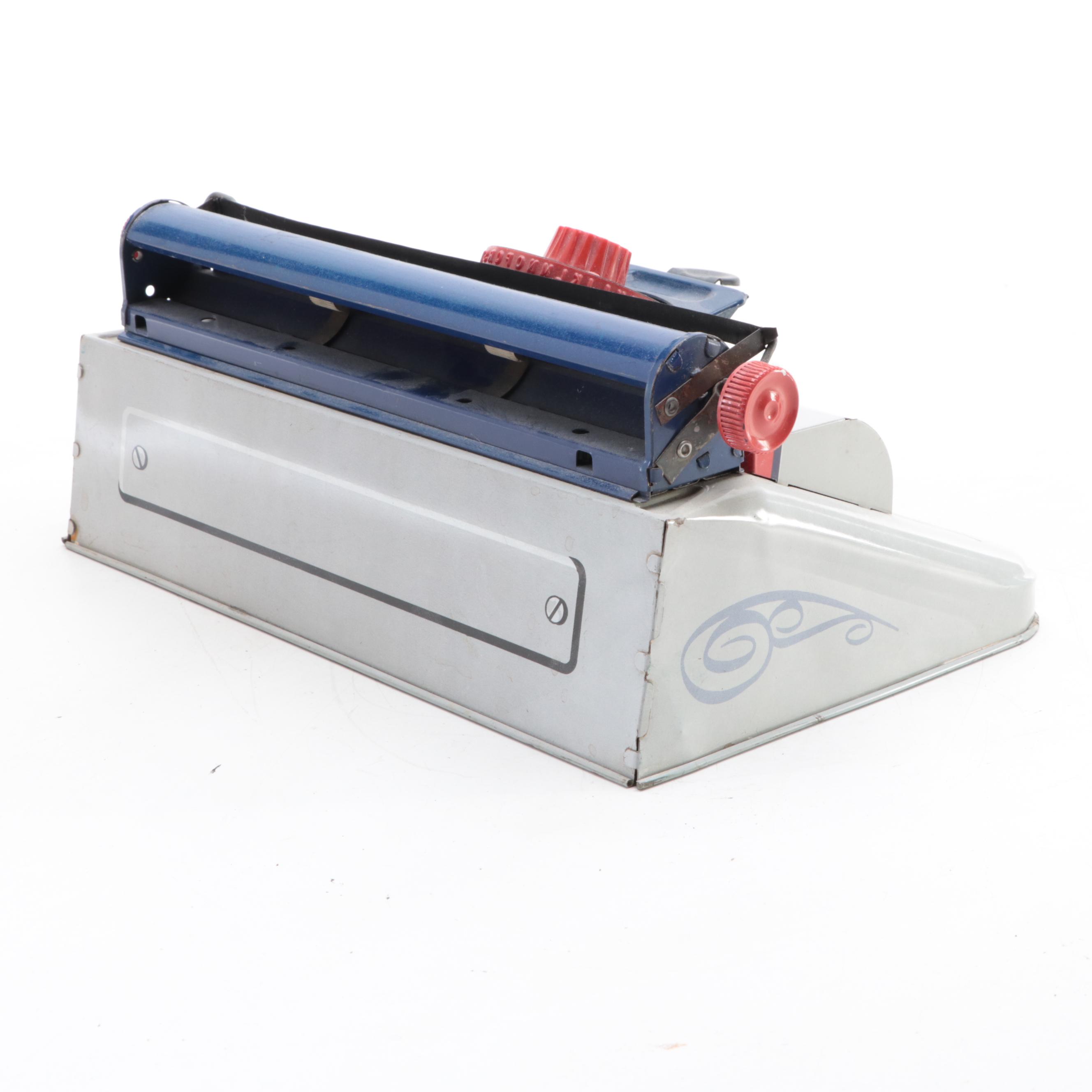 Marx Tin Lithograph “Junior" Dial Typewriter, Mid-20th Century | EBTH