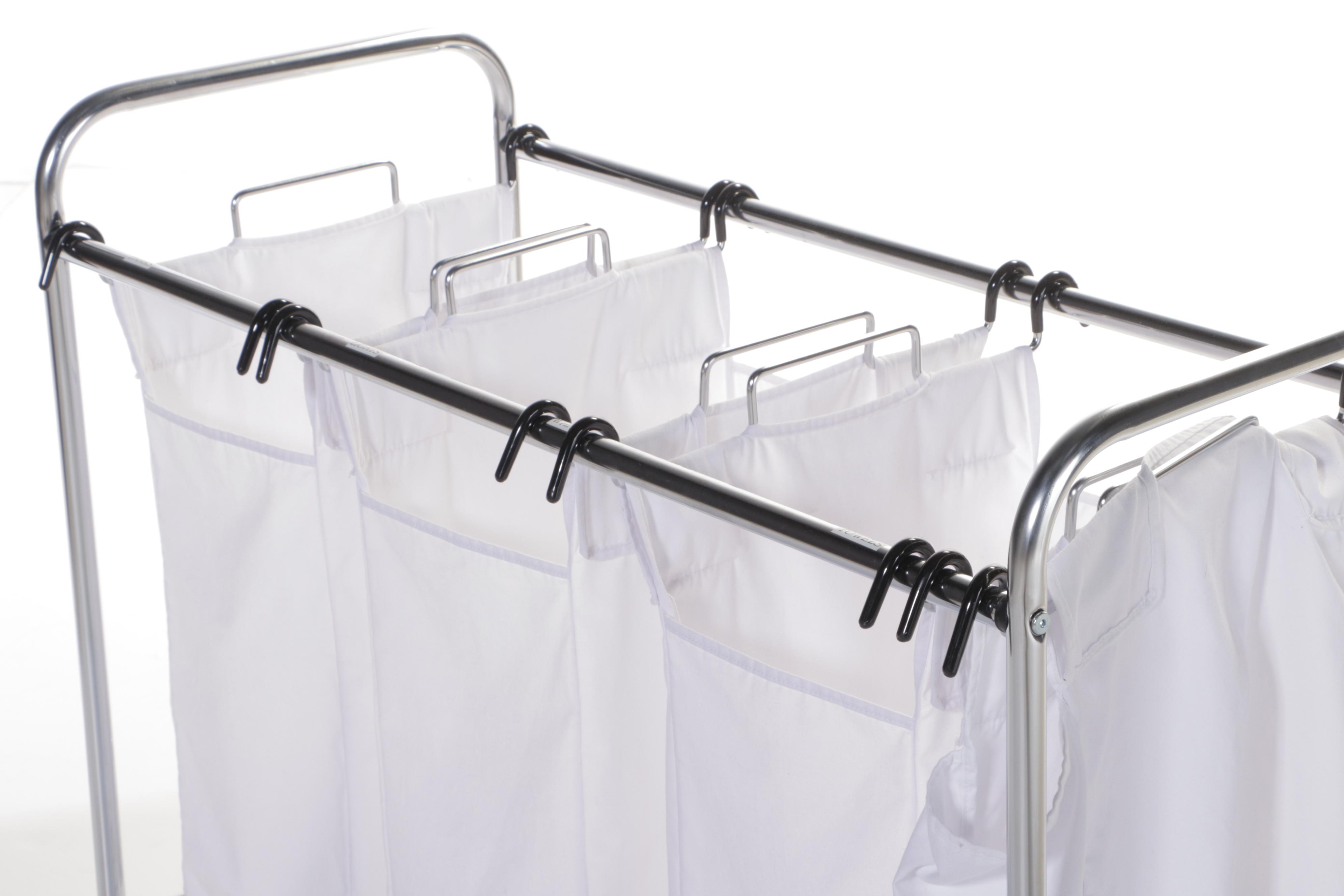 Divided Laundry Hamper on Casters With Stack of Clear Plastic Organizer ...
