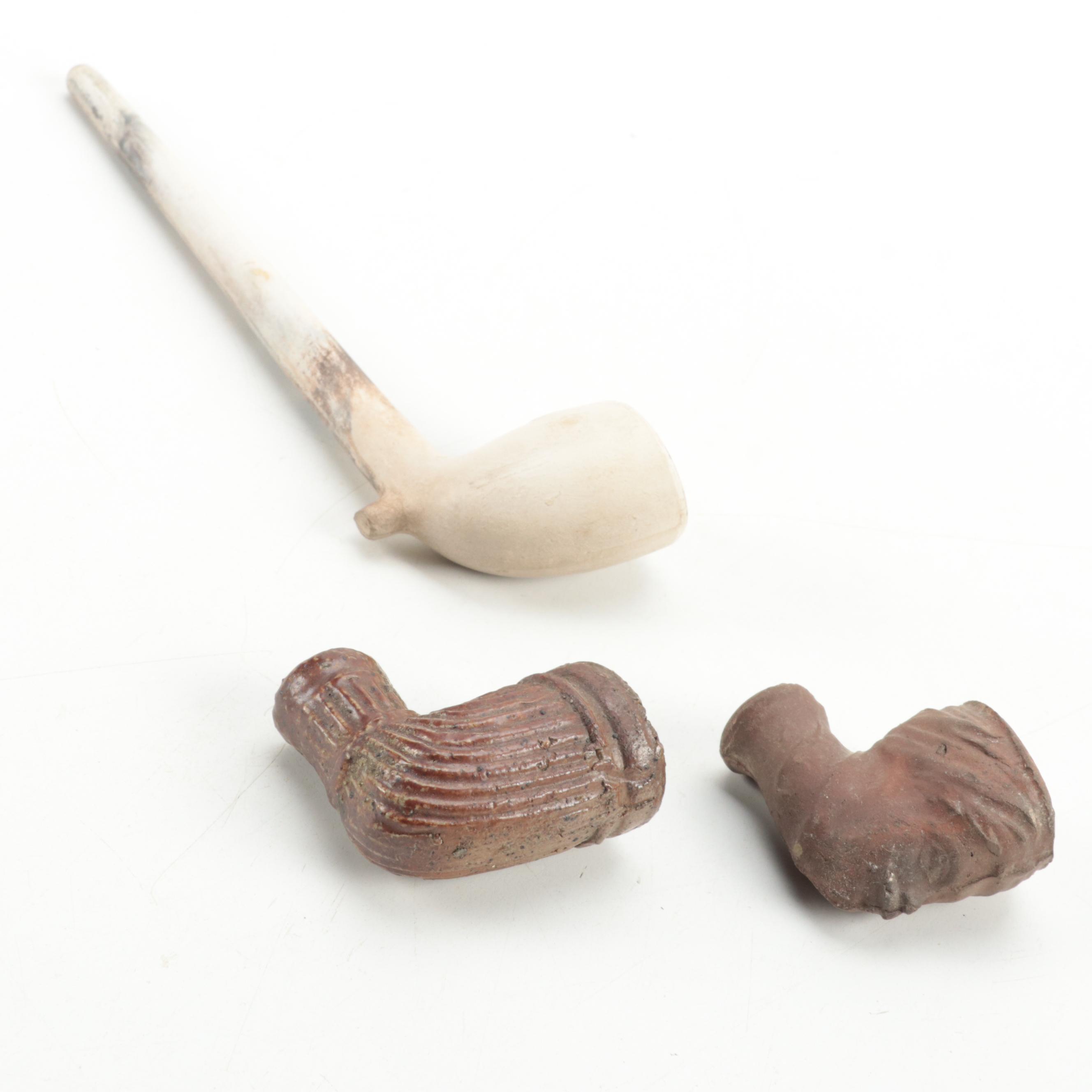 Earthenware, Wood and Meerschaum Pipe Bowls, Pipes with Arrowhead Bolo ...
