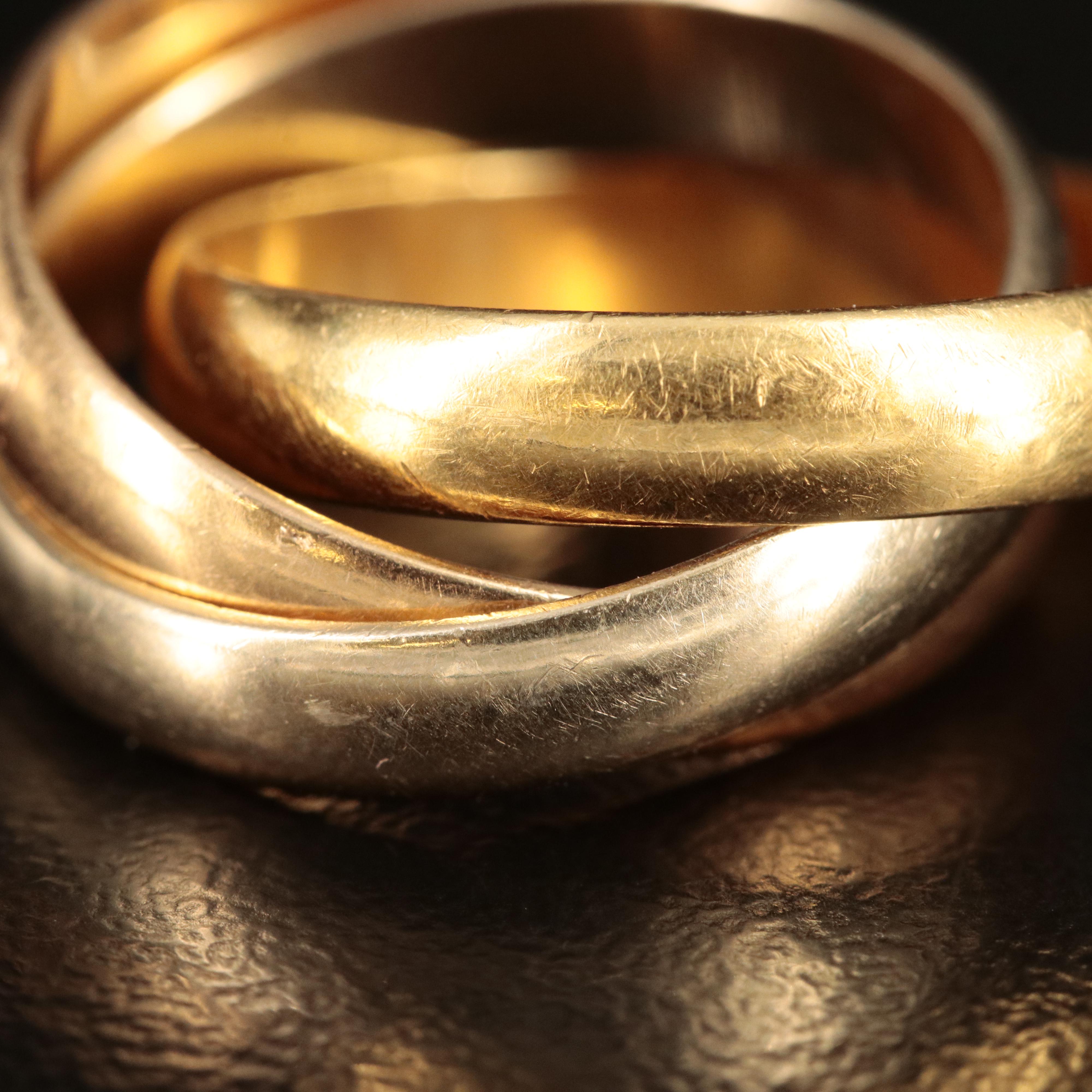 Les Must®de Cartier 18K Tri-Color Trinity Rolling Ring | EBTH