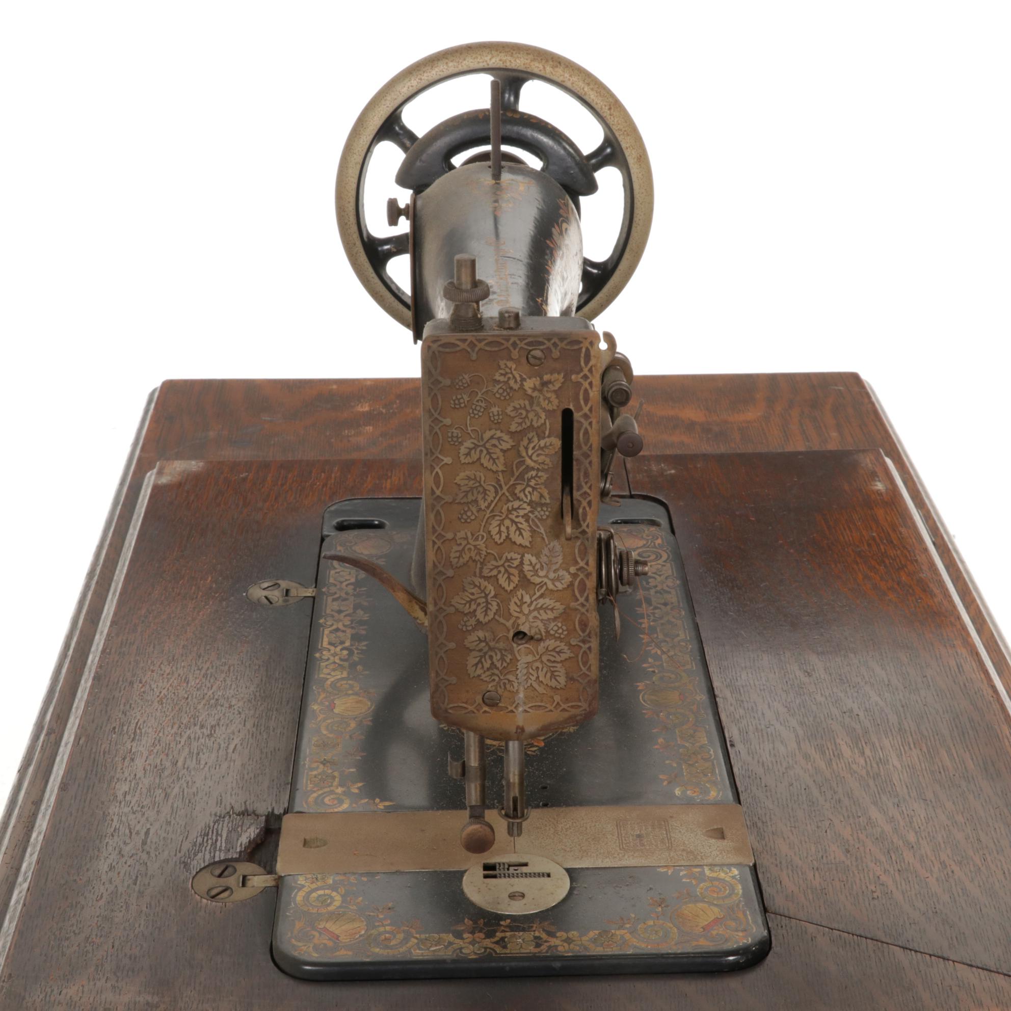 Singer Model 27-4 Treadle Sewing Machine in Oak and Iron Cabinet, Circa ...