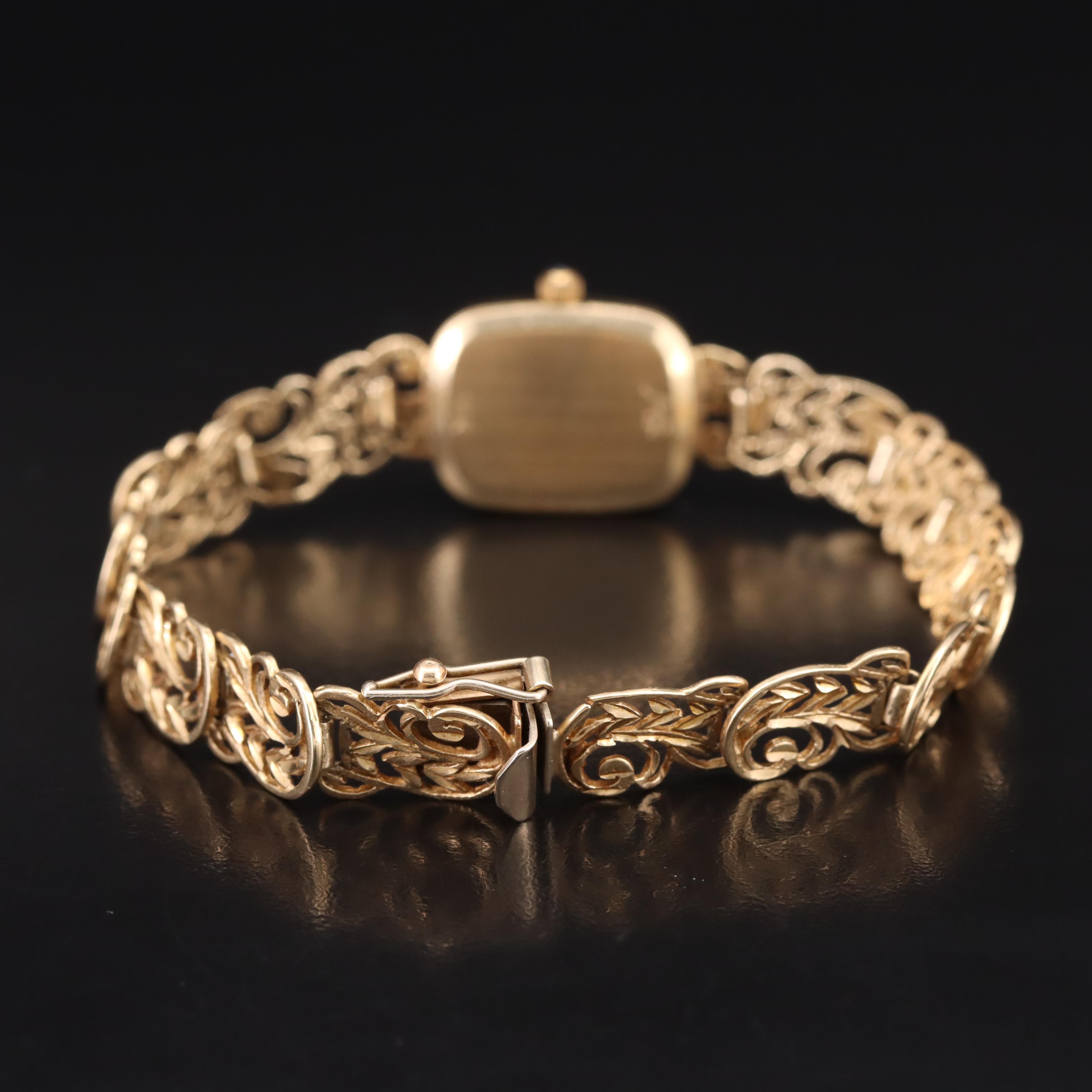 14K Michael Anthony Swiss Quartz Mother-of-Pearl Dial Wristwatch | EBTH