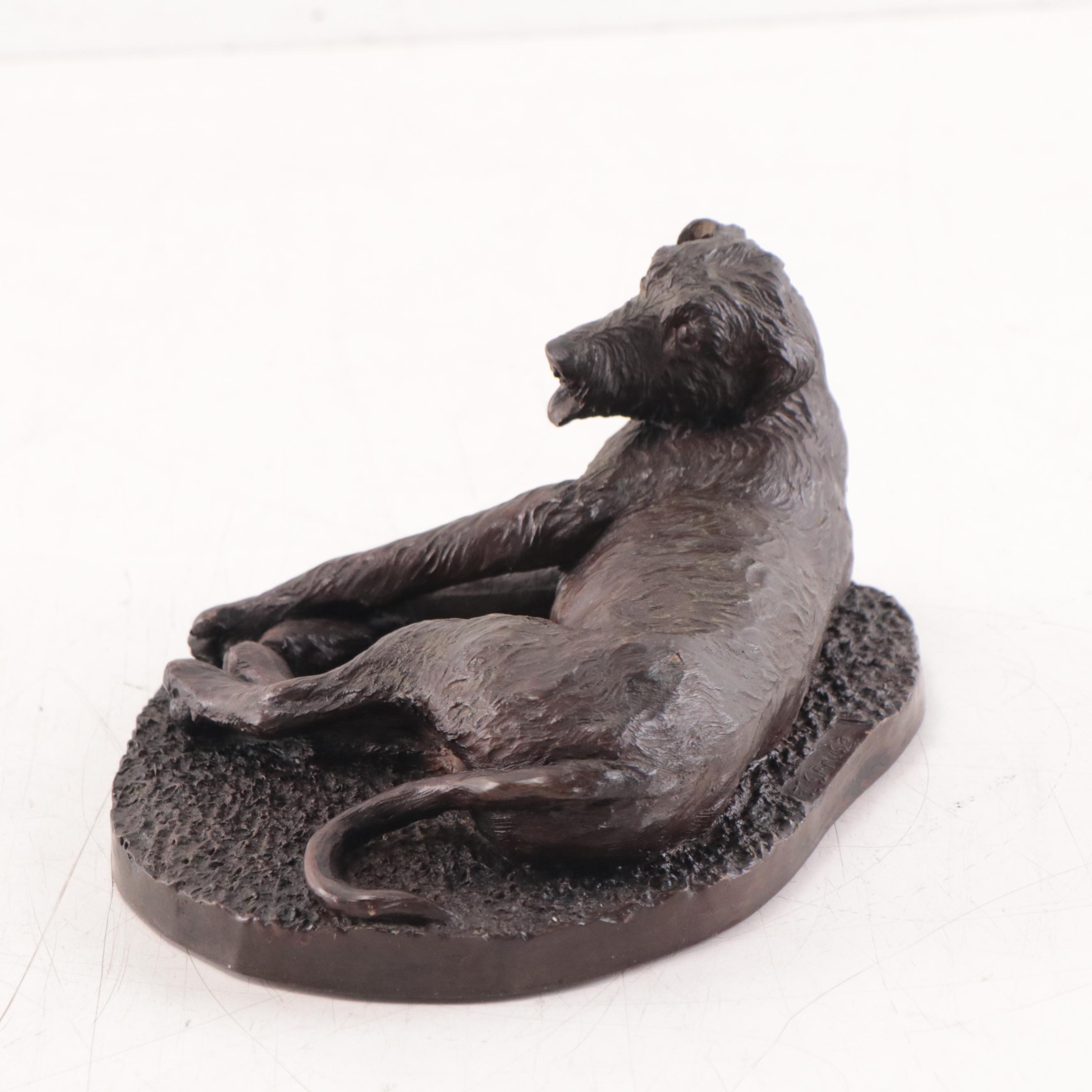 Resin Sculpture of Reclining Dog | EBTH