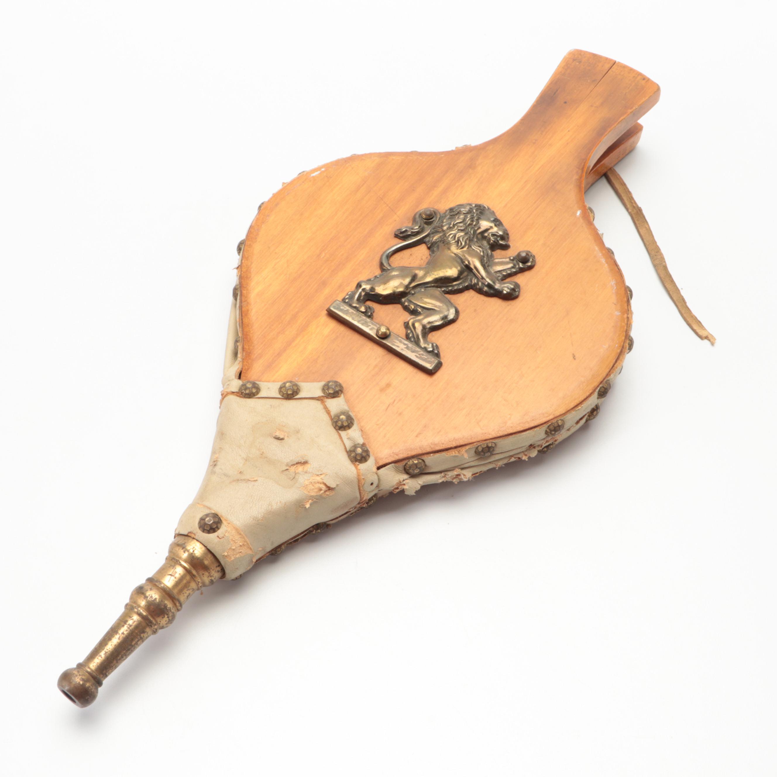 Carved Wood and Hide Drum with Brass Lion Bellows | EBTH