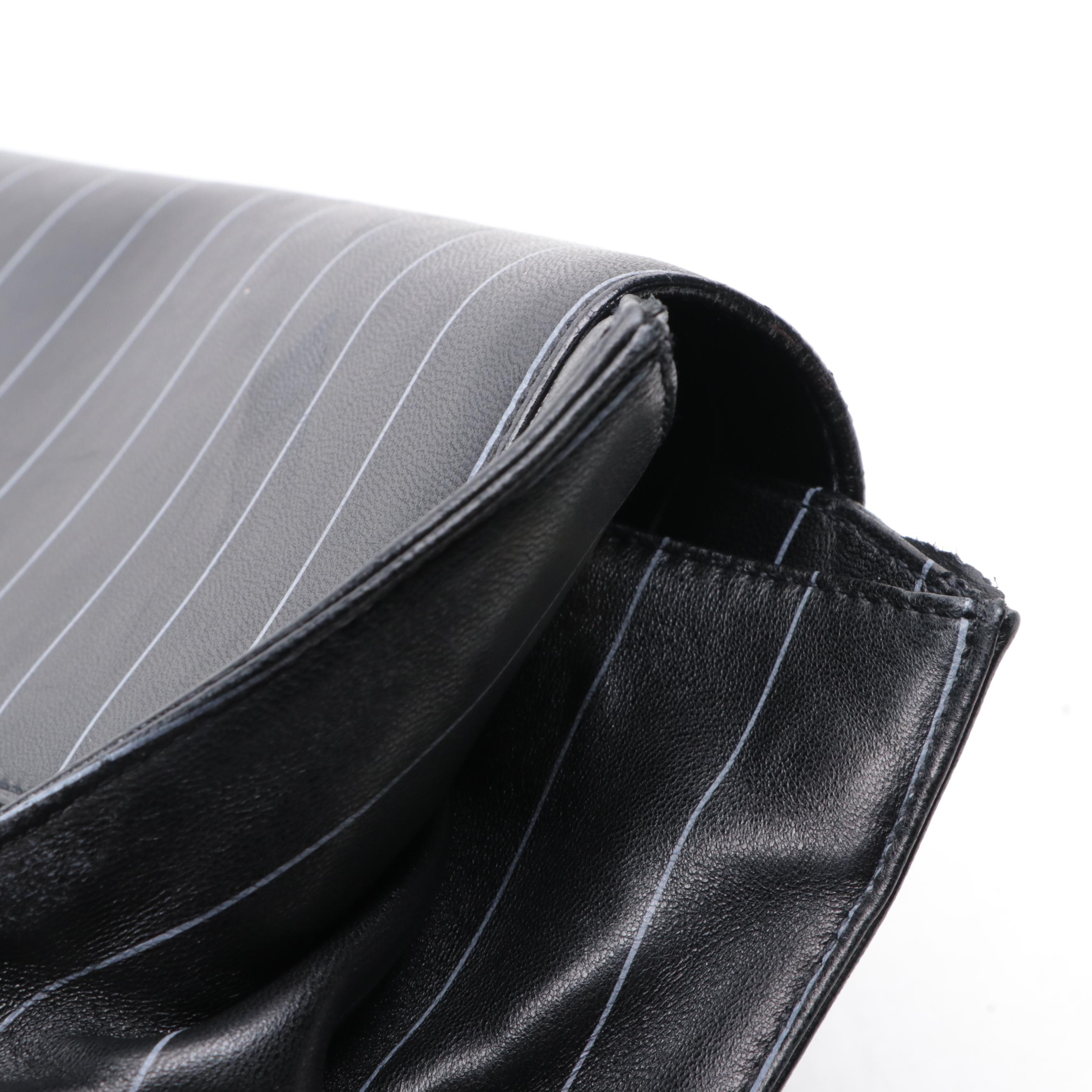 Gianni Versace Clutch in Pinstriped Leather | EBTH