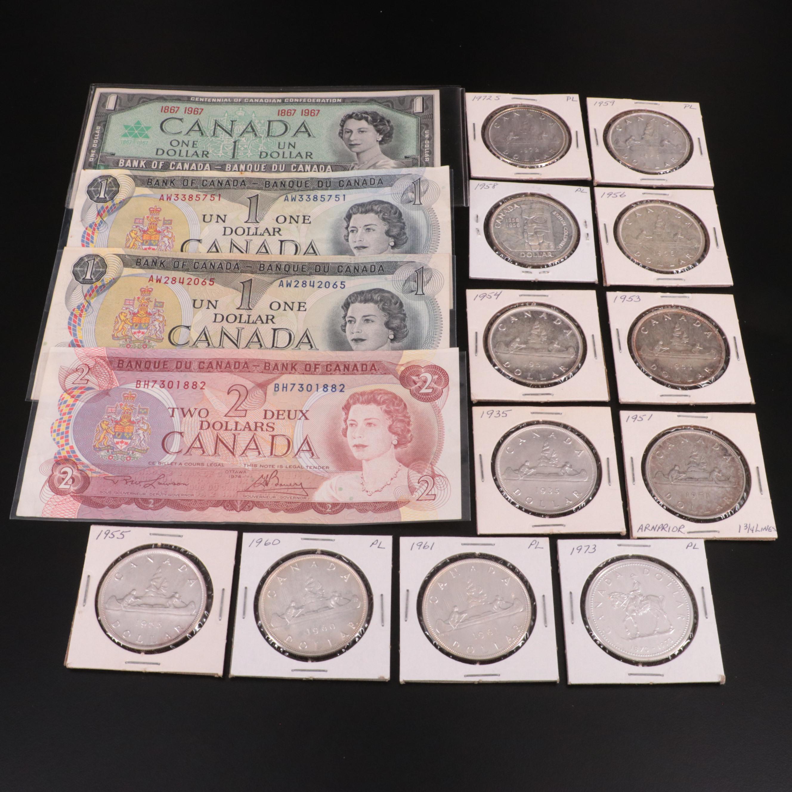 Group of Twelve Canada Silver Dollars and Four Currency Notes | EBTH