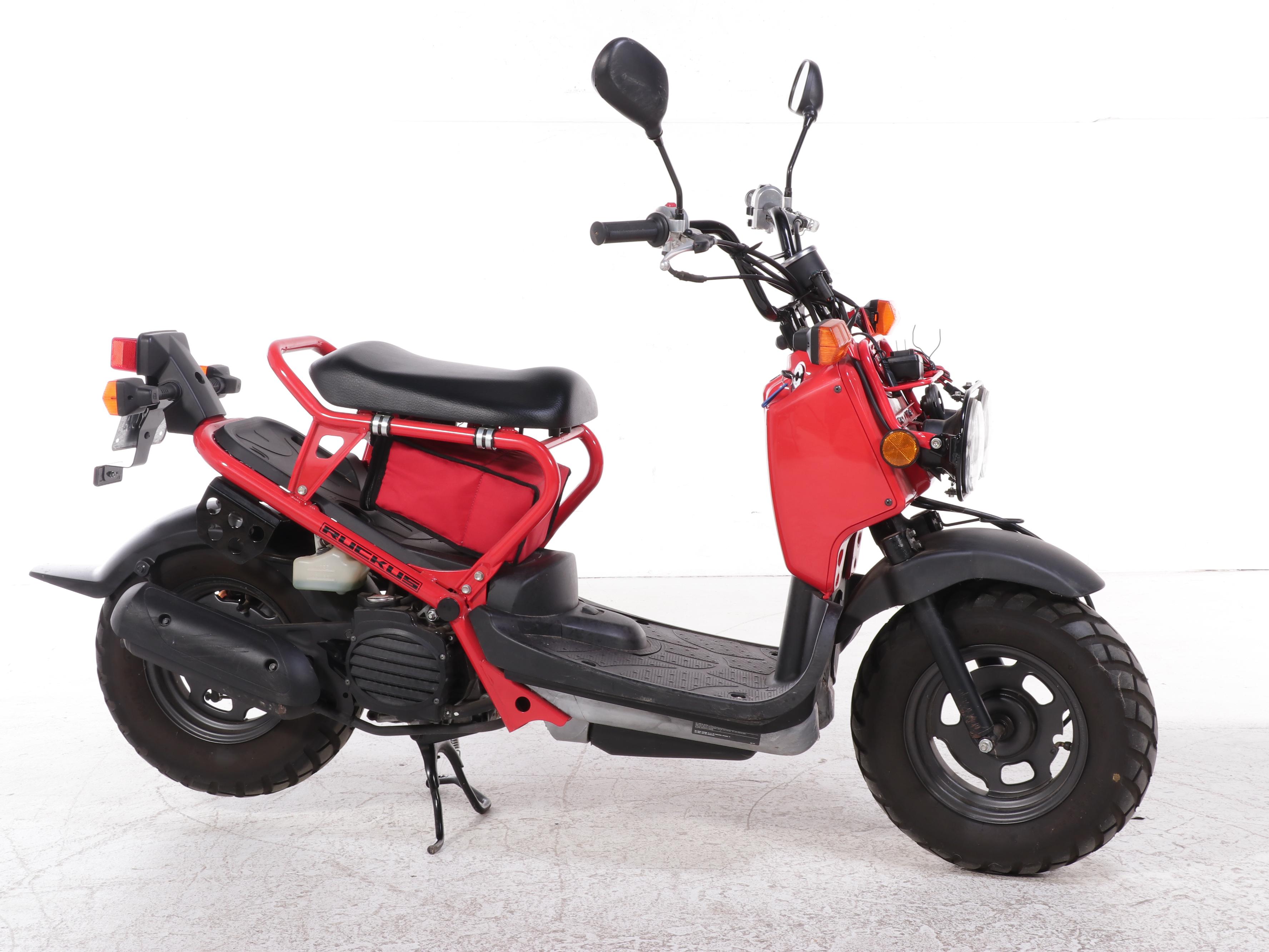 2009 Honda Ruckus Scooter in Red with with HJC Half-Shell Helmets | EBTH